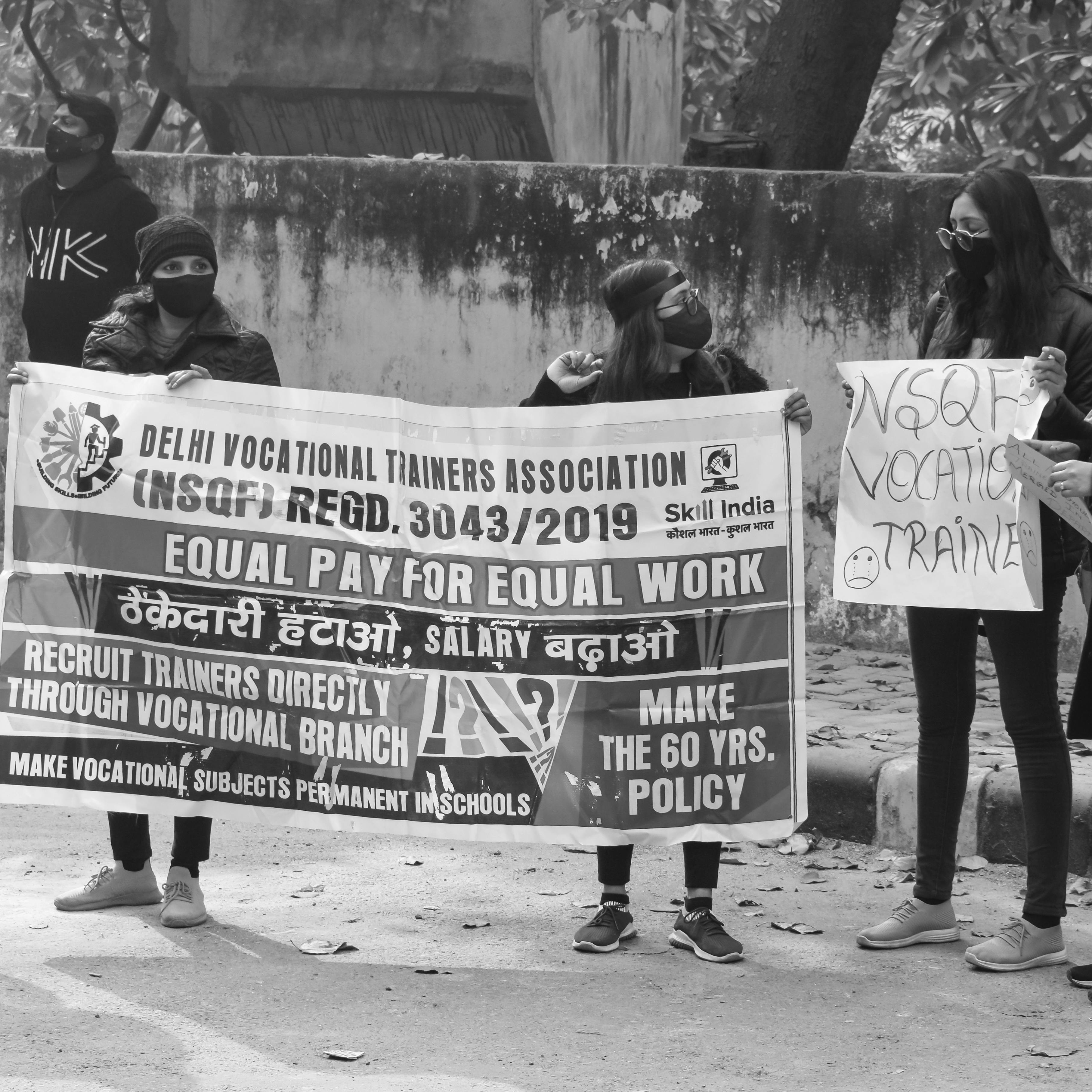 Grayscale Photography of People Holding Placards while Protesting ...