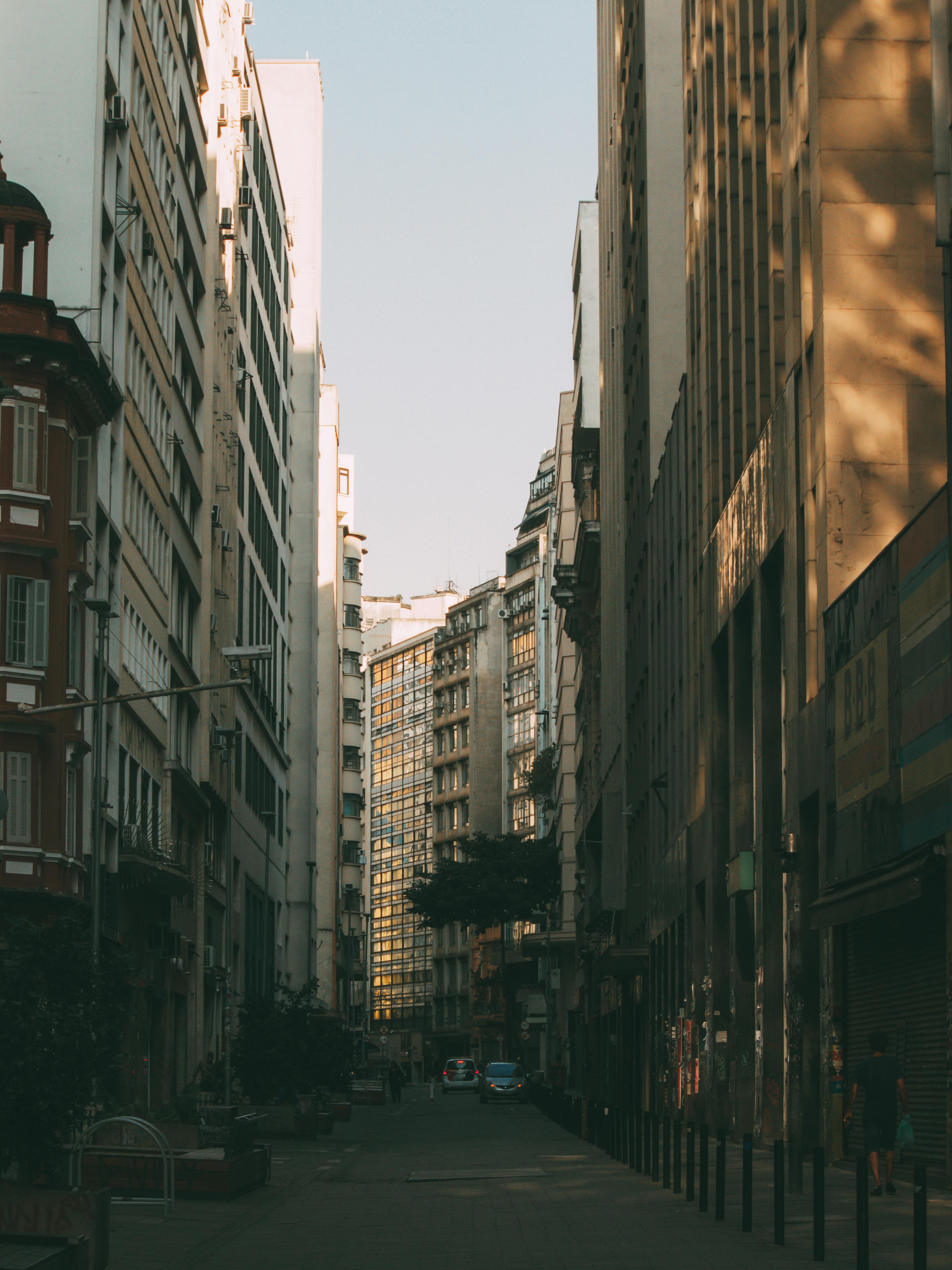 Road Between High Rise Buildings · Free Stock Photo