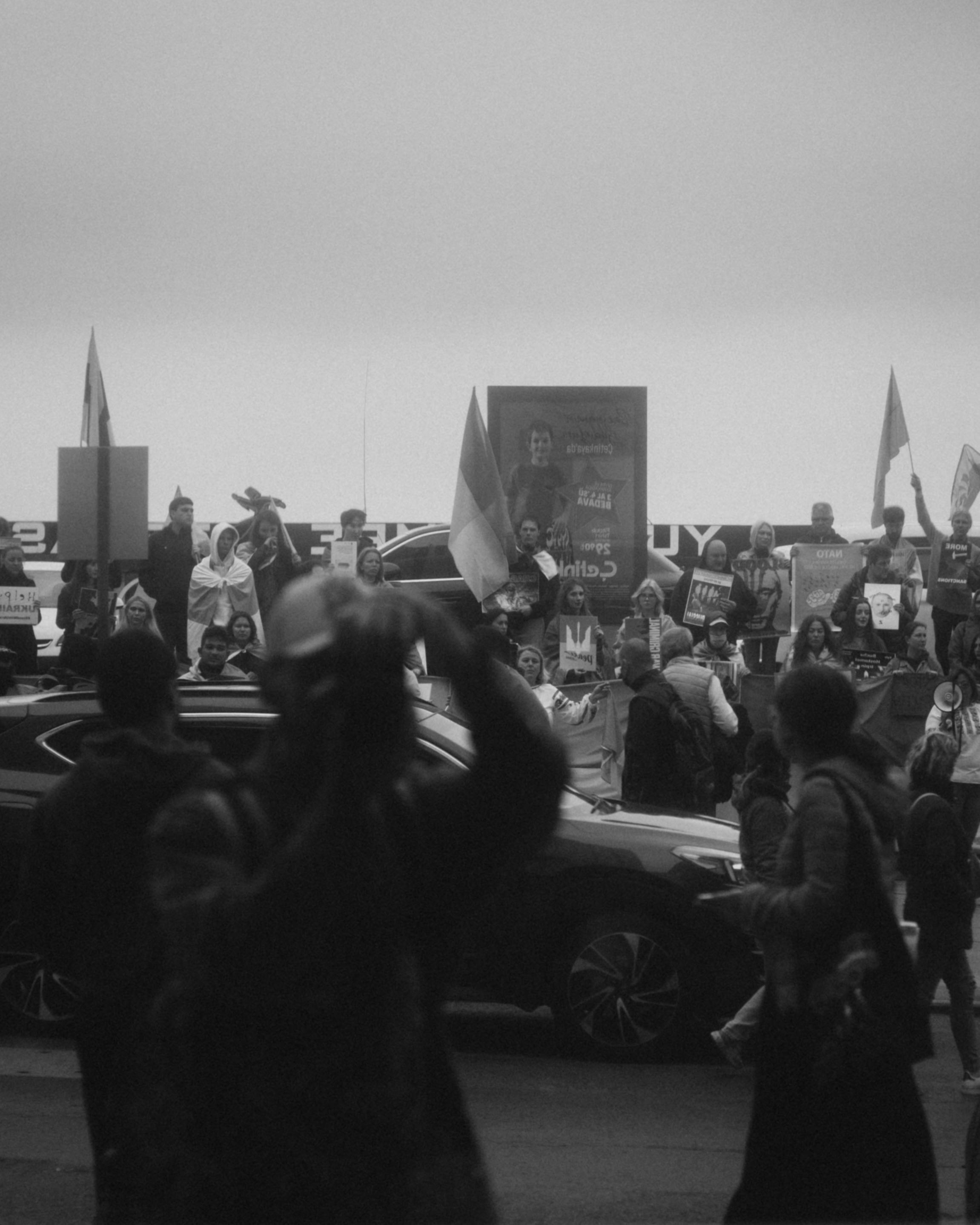 A Grayscale of Men Protesting · Free Stock Photo