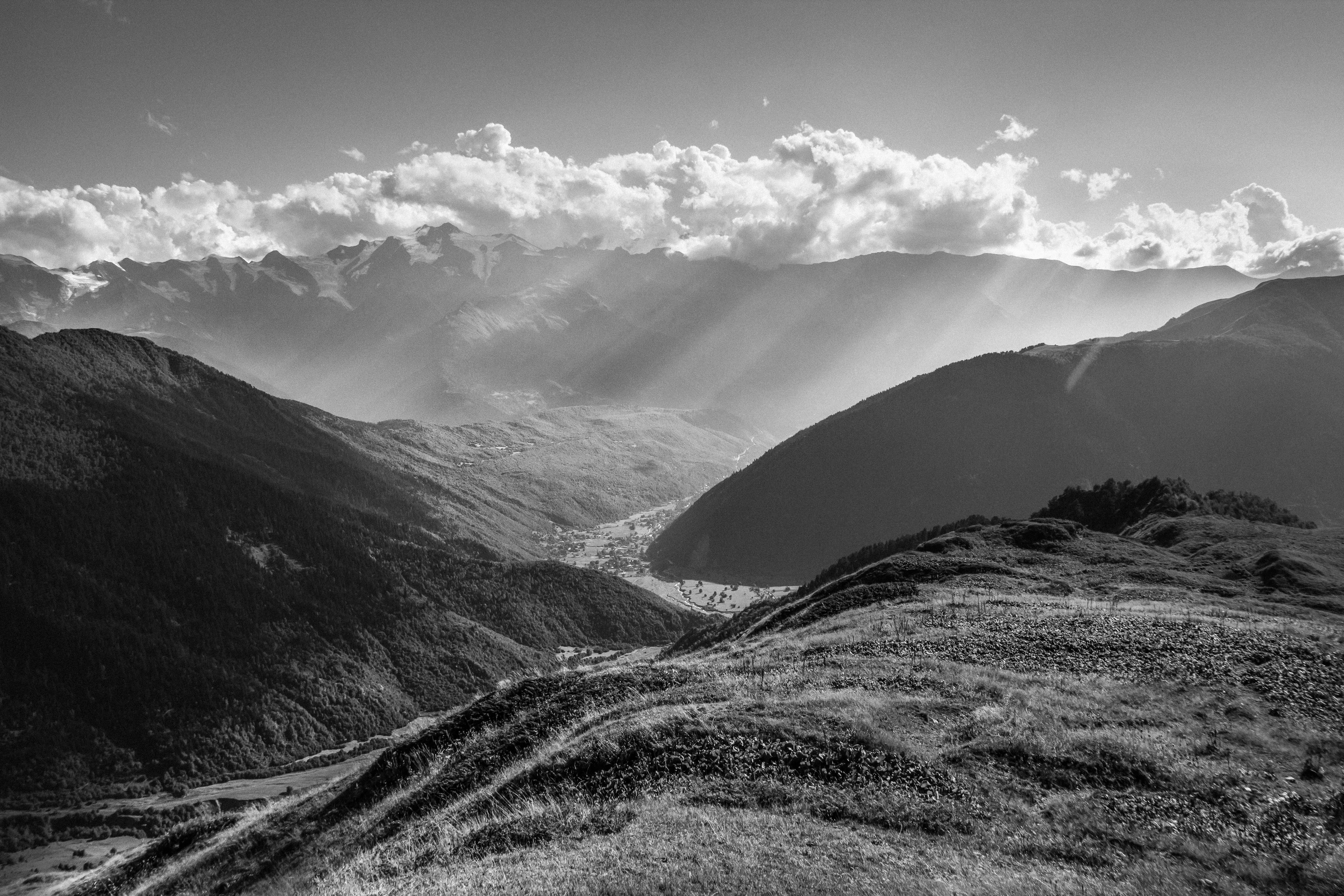 Grayscale Photo of Mountains · Free Stock Photo