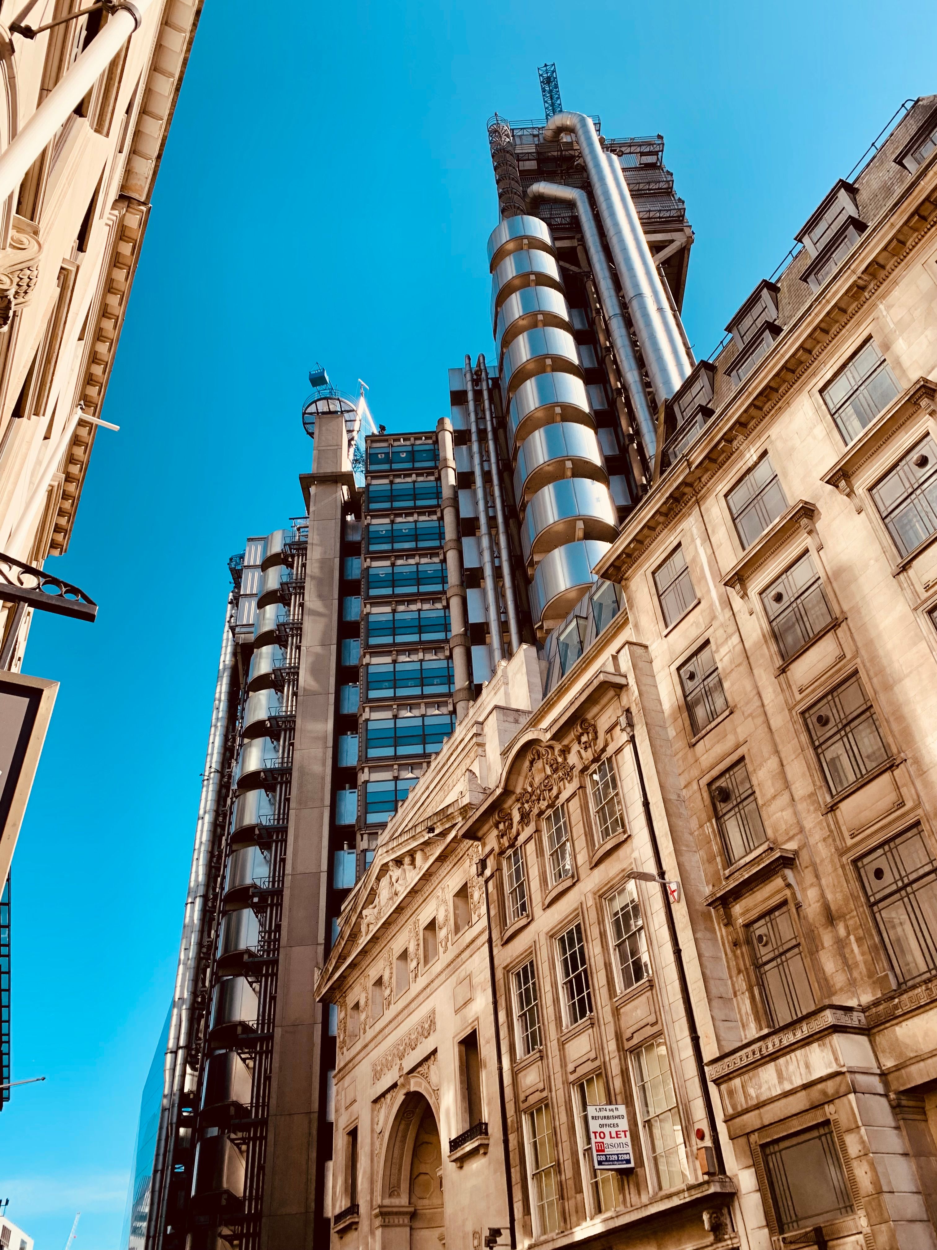 Low Angle Photo Of Buildings During Daytime · Free Stock Photo
