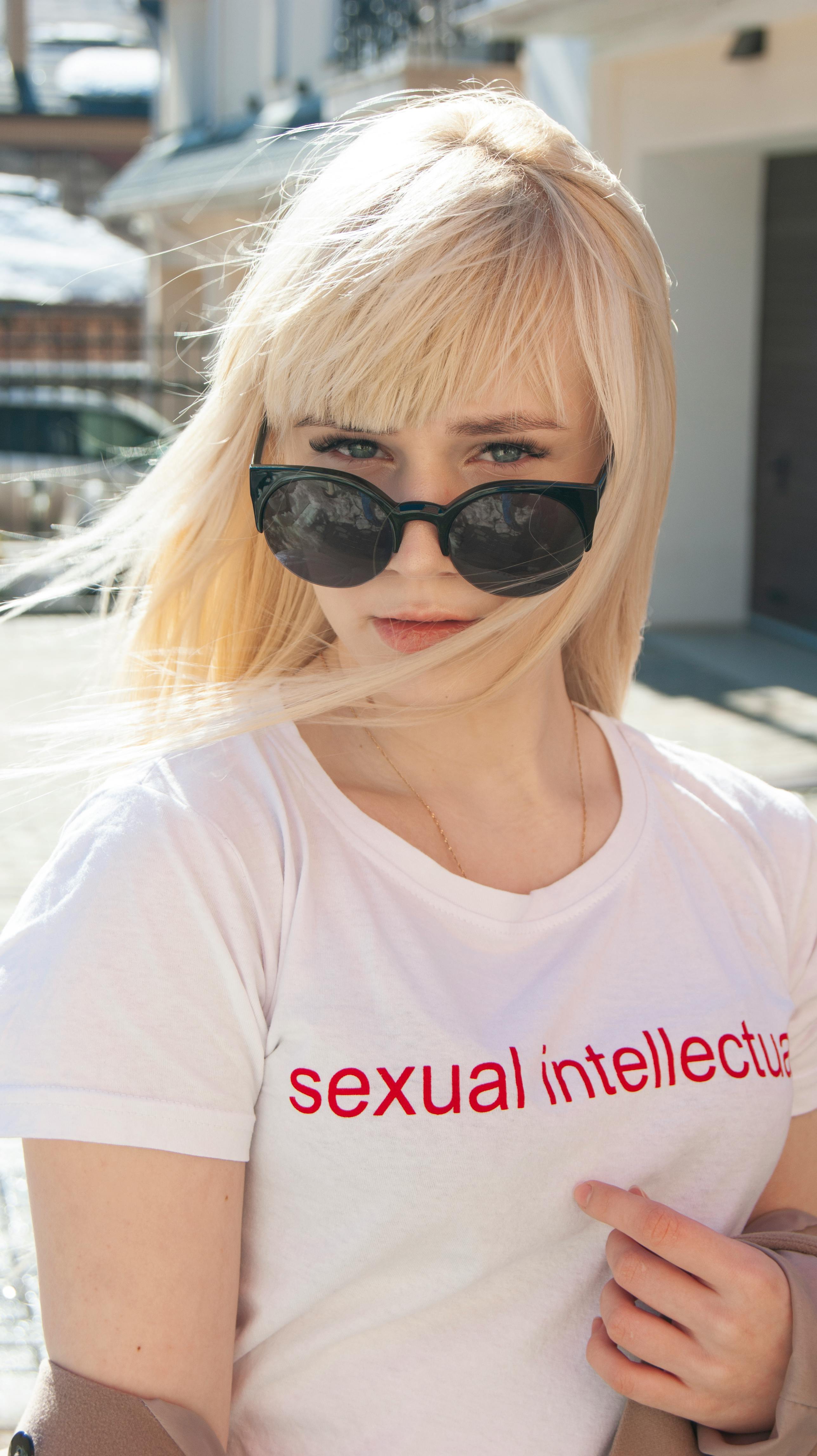 Photo of a Standing Woman Looking at Her Left · Free Stock Photo