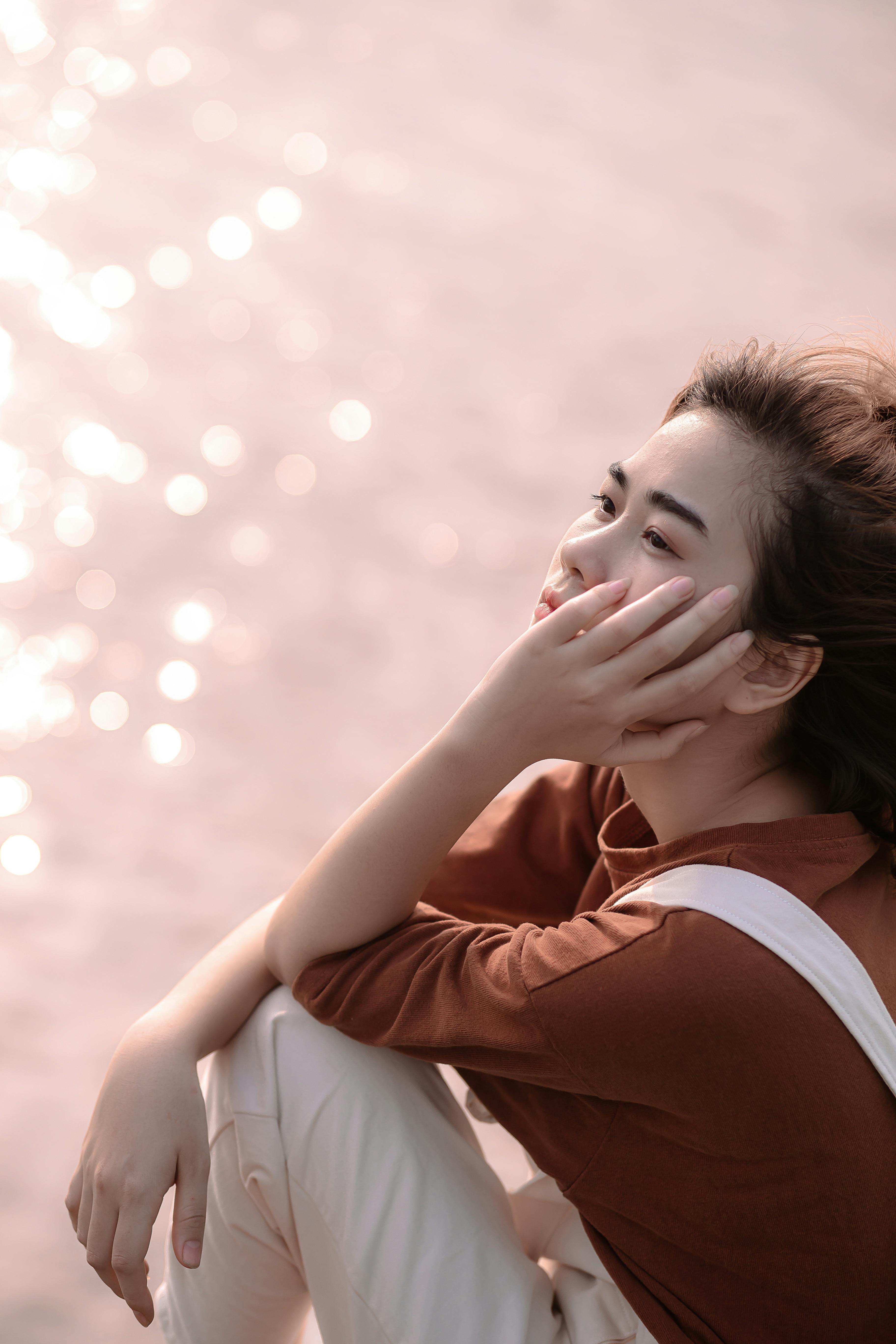 Woman Holding Her Cheek · Free Stock Photo