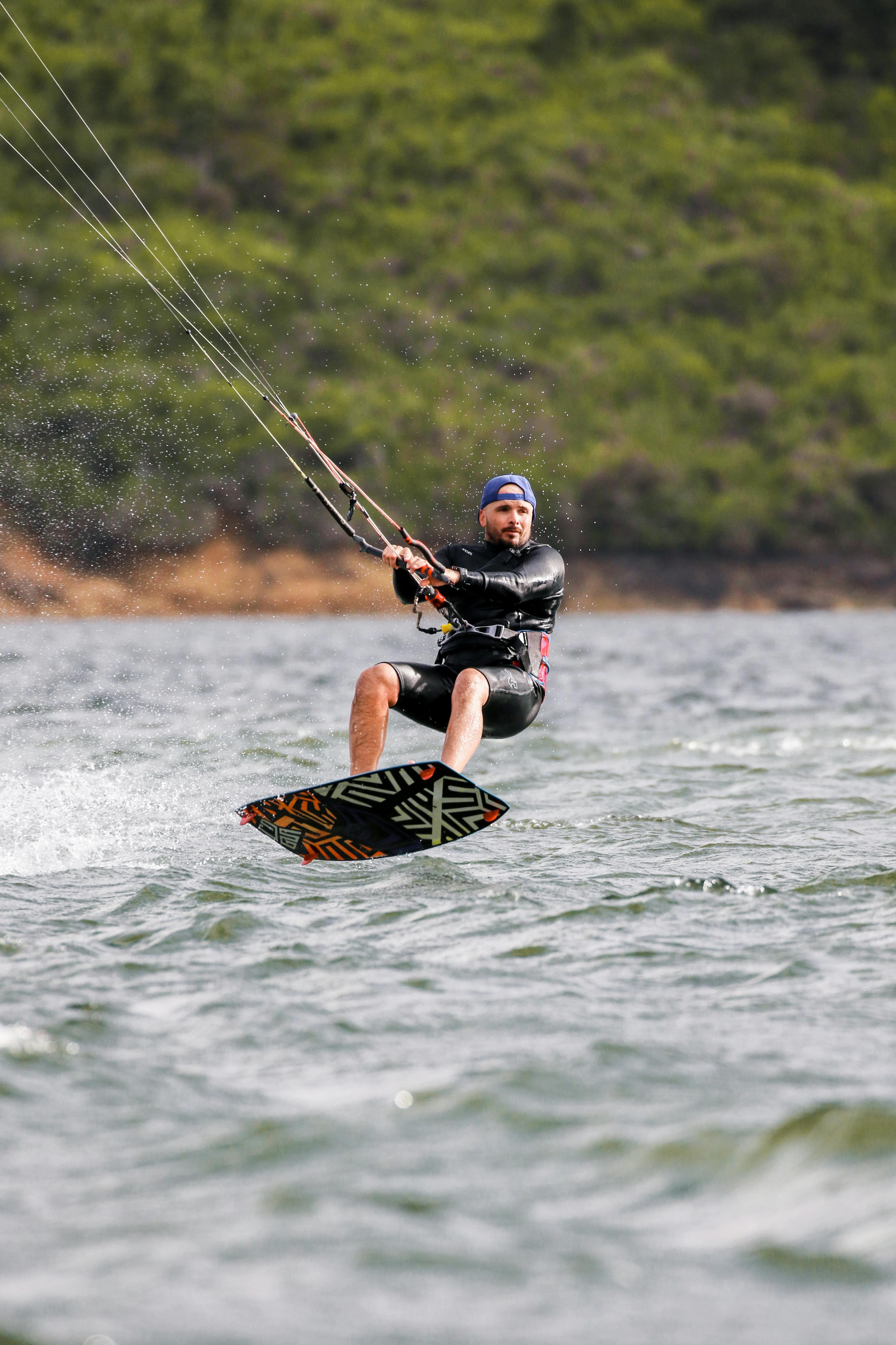 Water Boarding During Sunset · Free Stock Photo