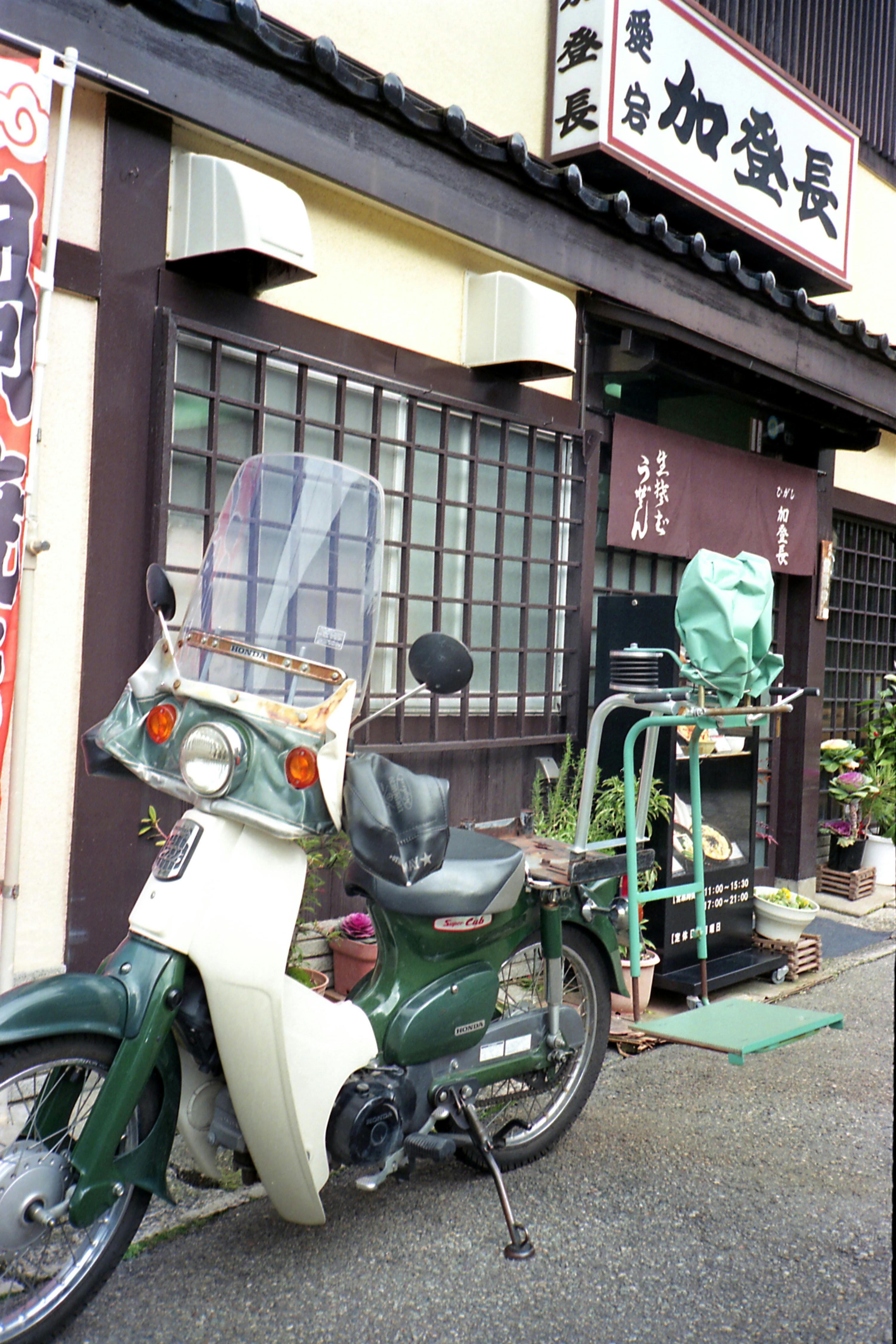 Photo of Motorcycles Parked Near Fast Food Restaurants · Free Stock Photo
