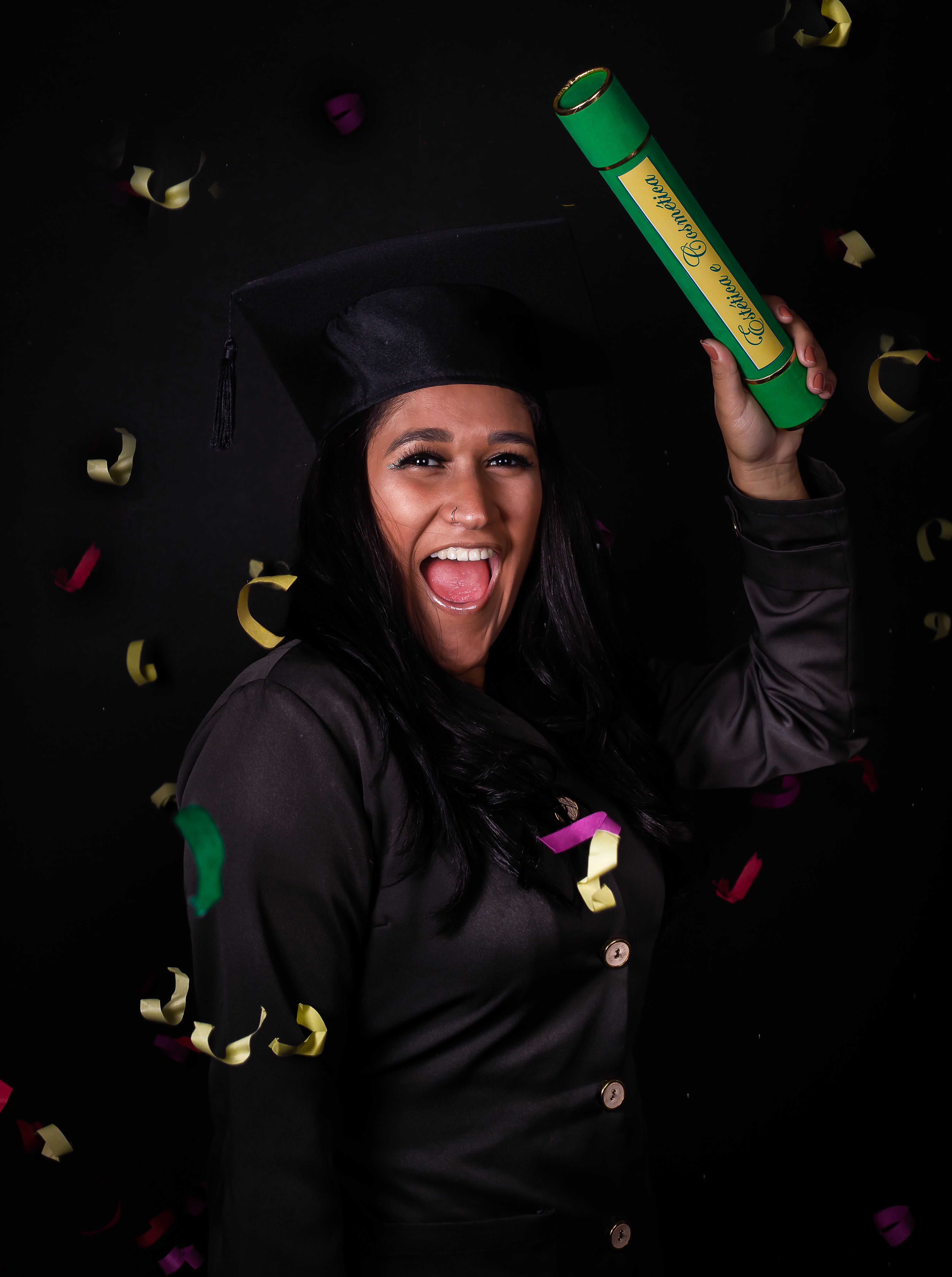Happy Woman with Diploma at Graduation Ceremony · Free Stock Photo