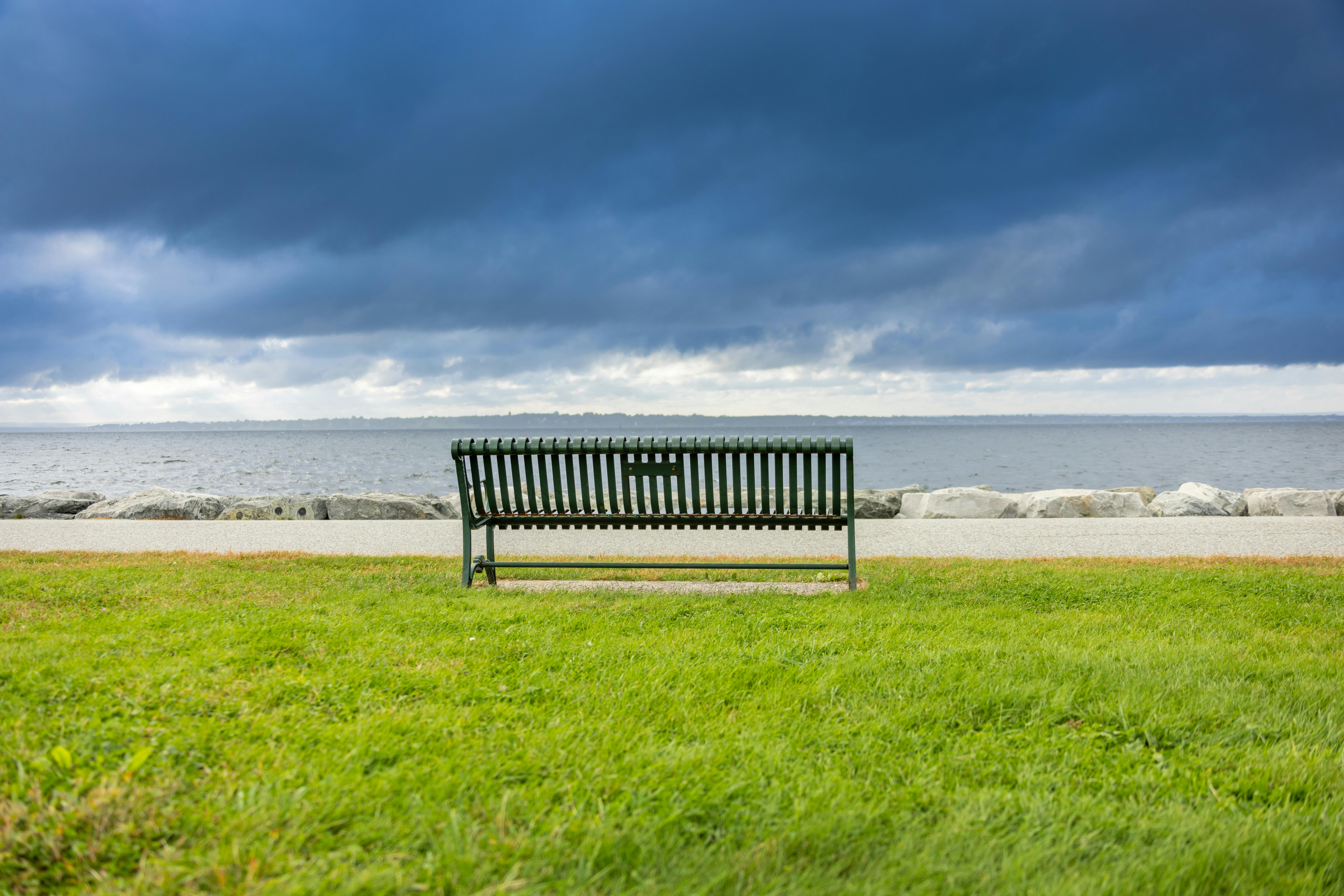 Empty Bench on Ocean Front · Free Stock Photo