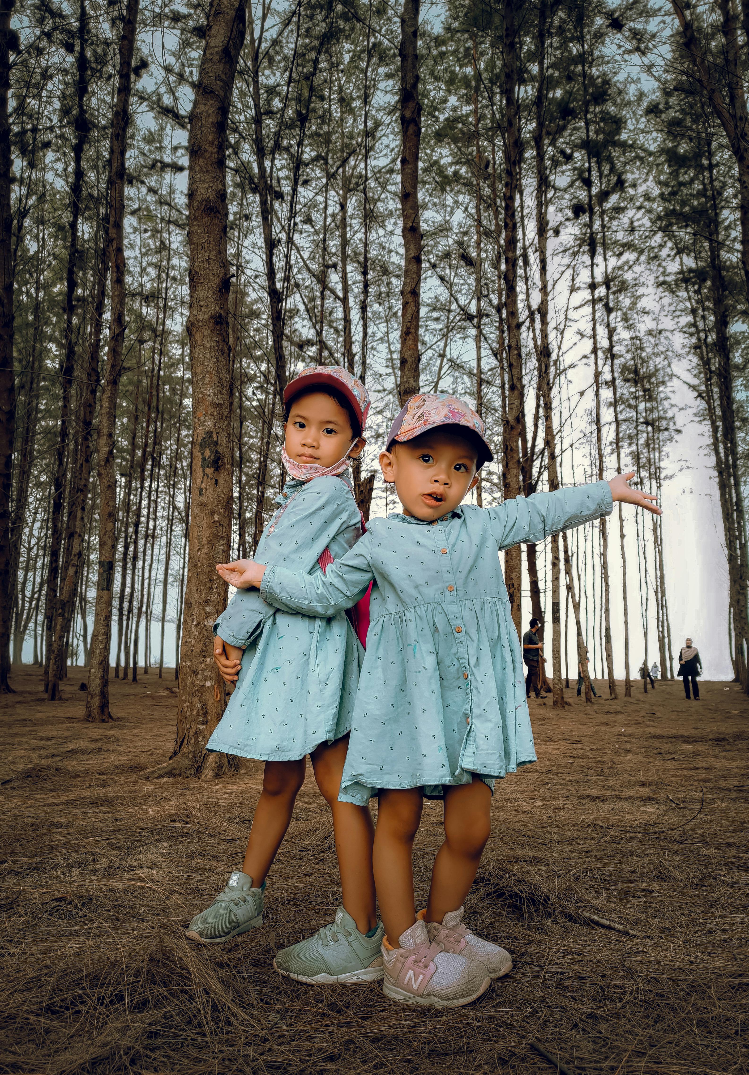 Woman and a Girl Wearing Matching Floral Dress · Free Stock Photo