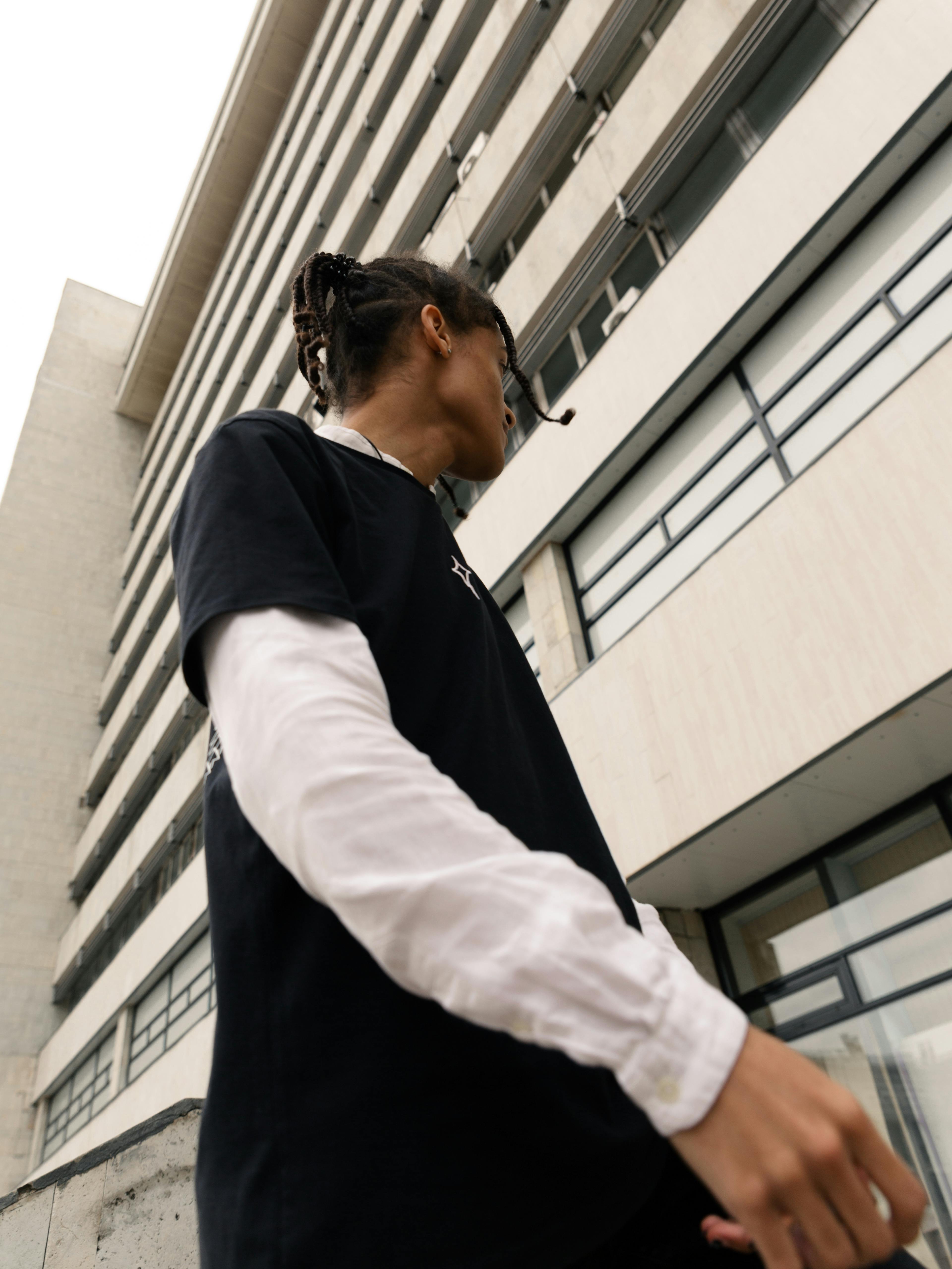 Man against Urban Building · Free Stock Photo