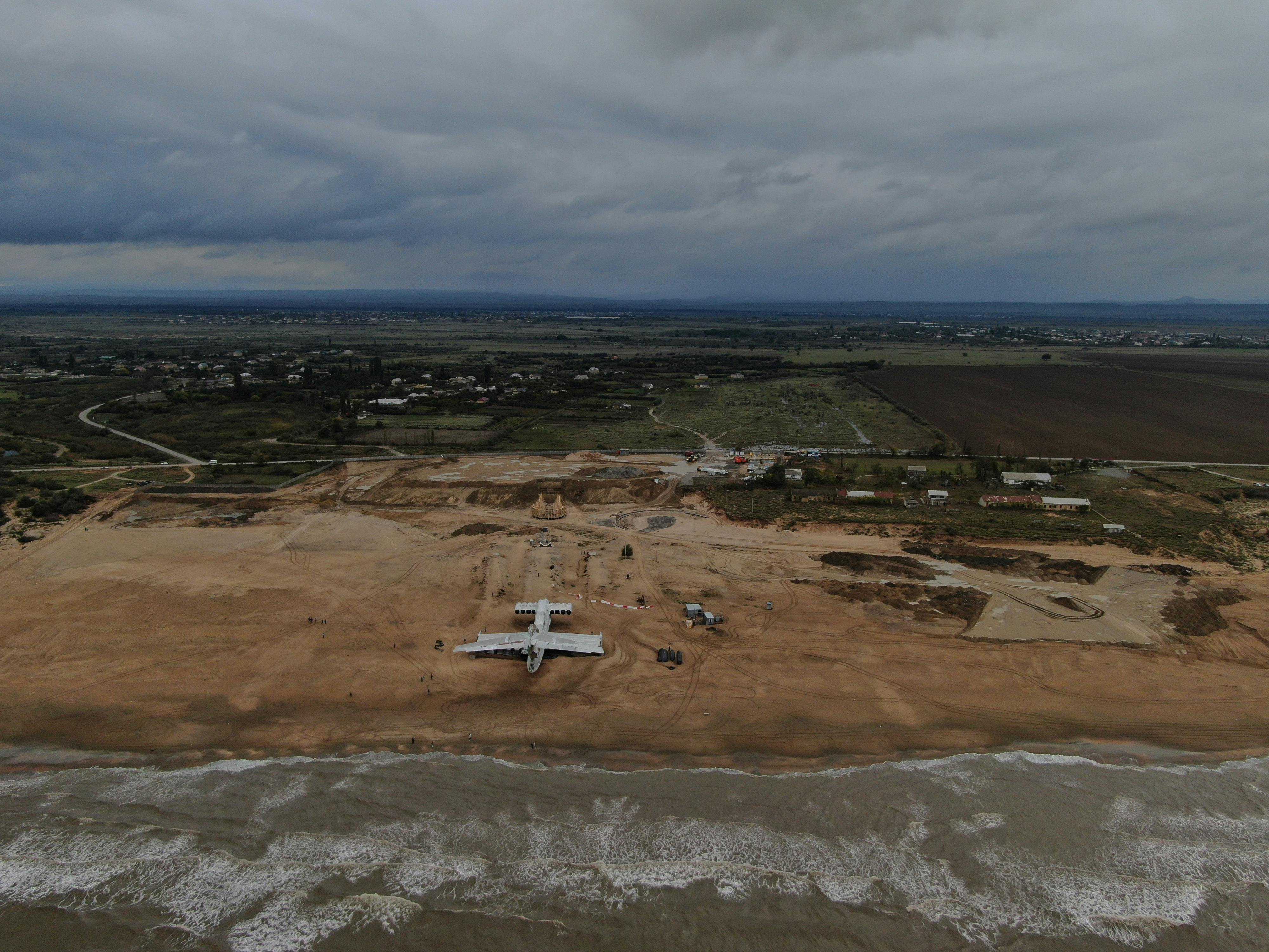 Airplane Flying Over Cliff · Free Stock Photo