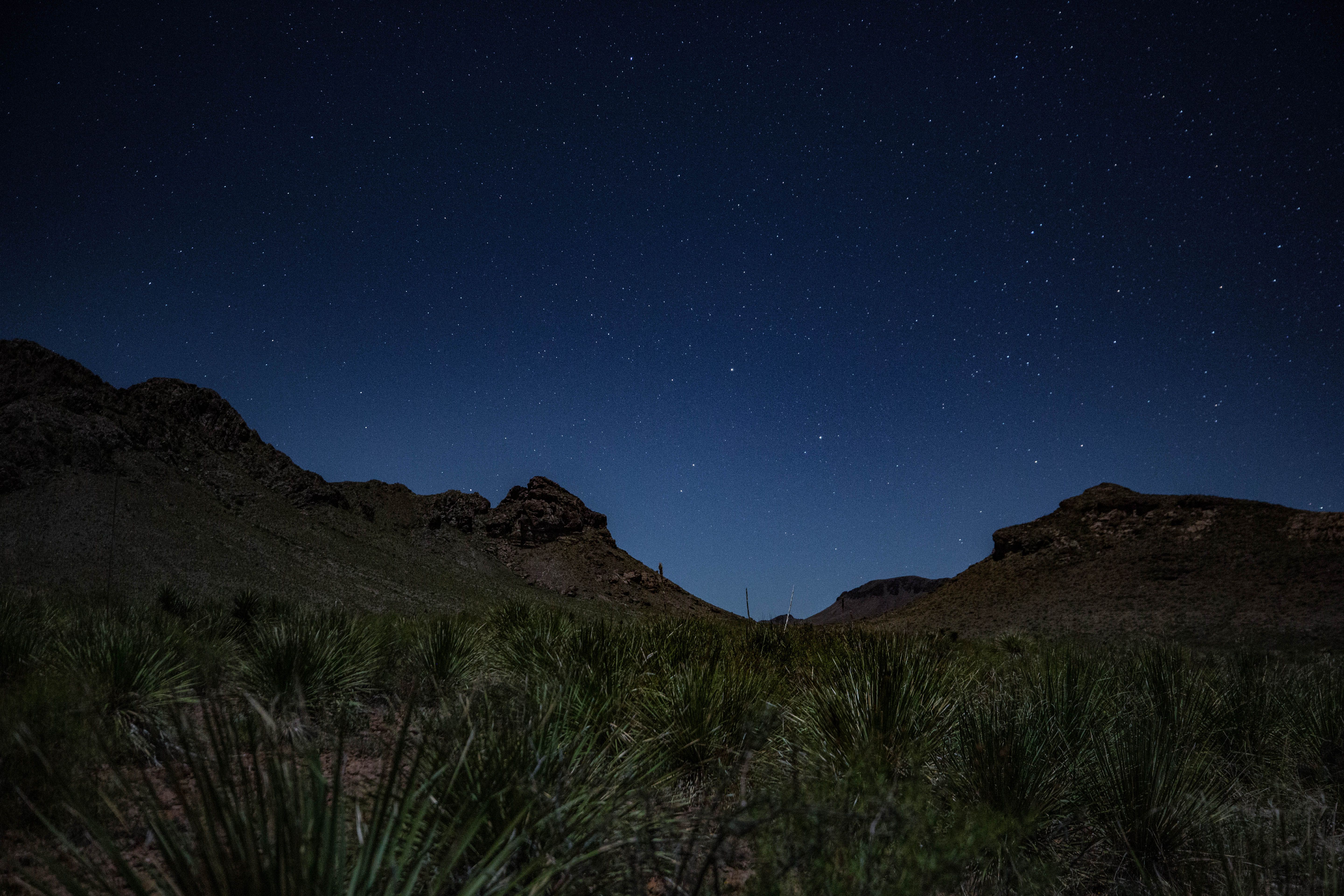 Hills Under the Starry Night · Free Stock Photo