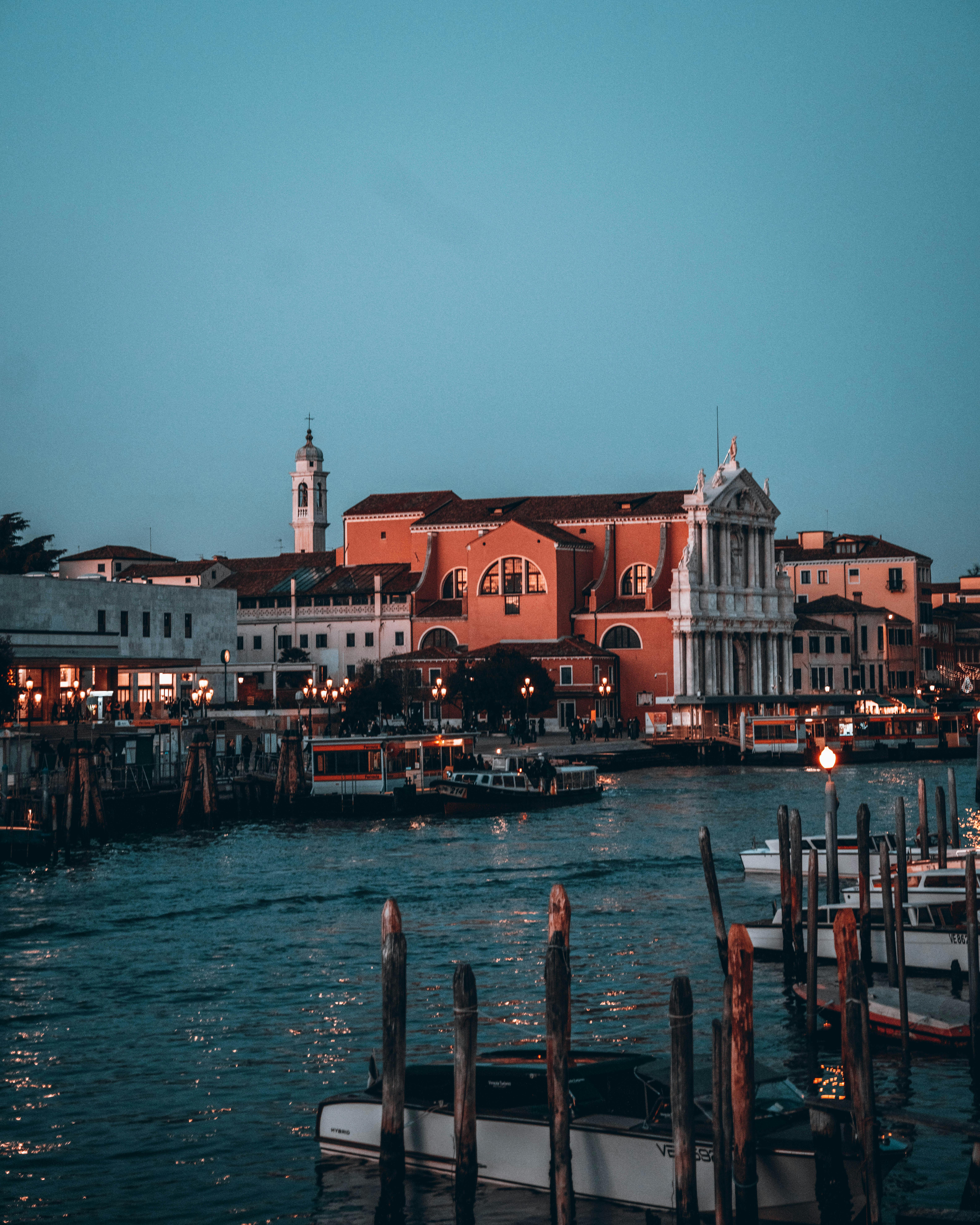 Concrete Building Near the Water · Free Stock Photo