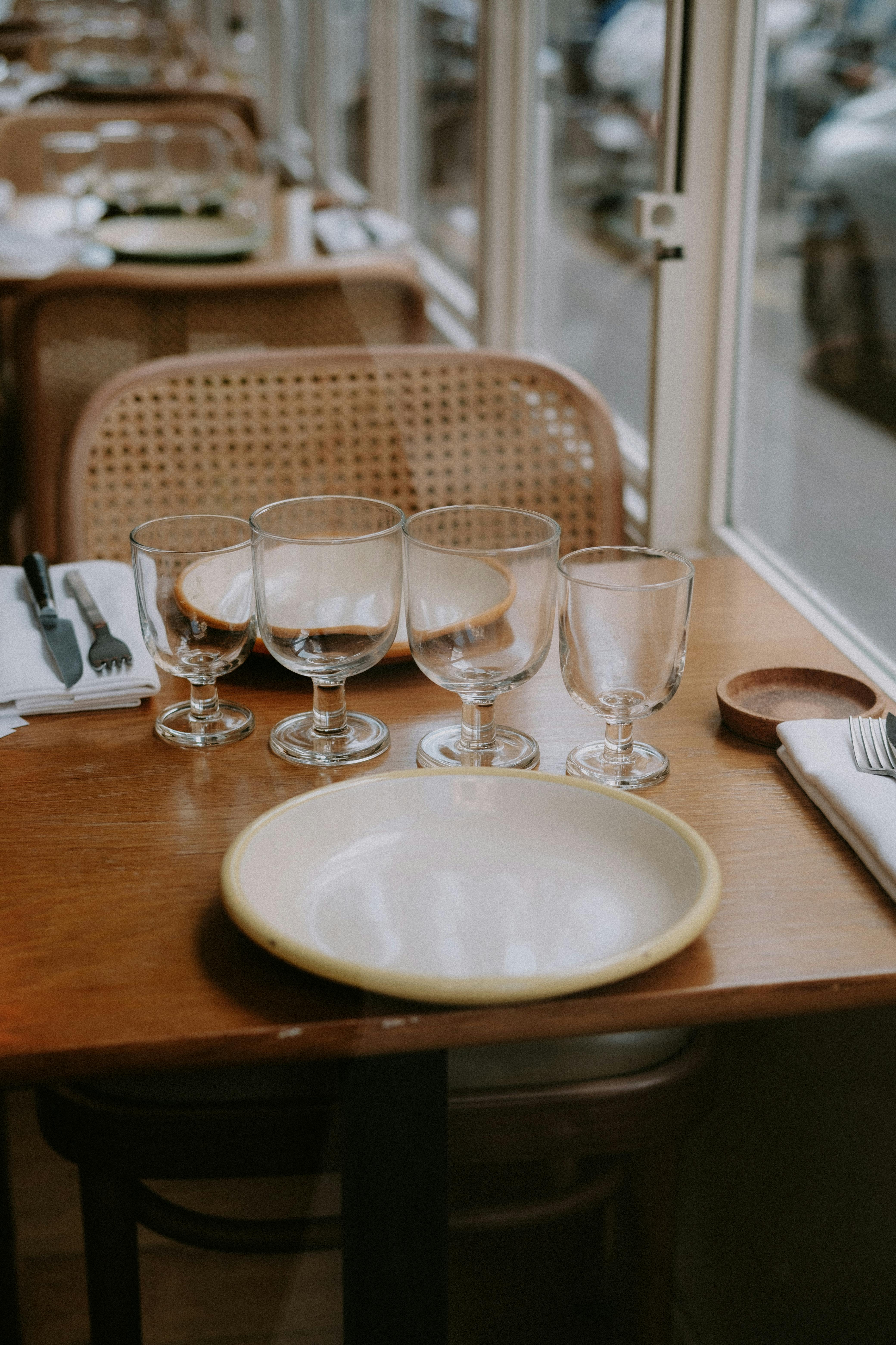 Glasses and Plates on Table · Free Stock Photo
