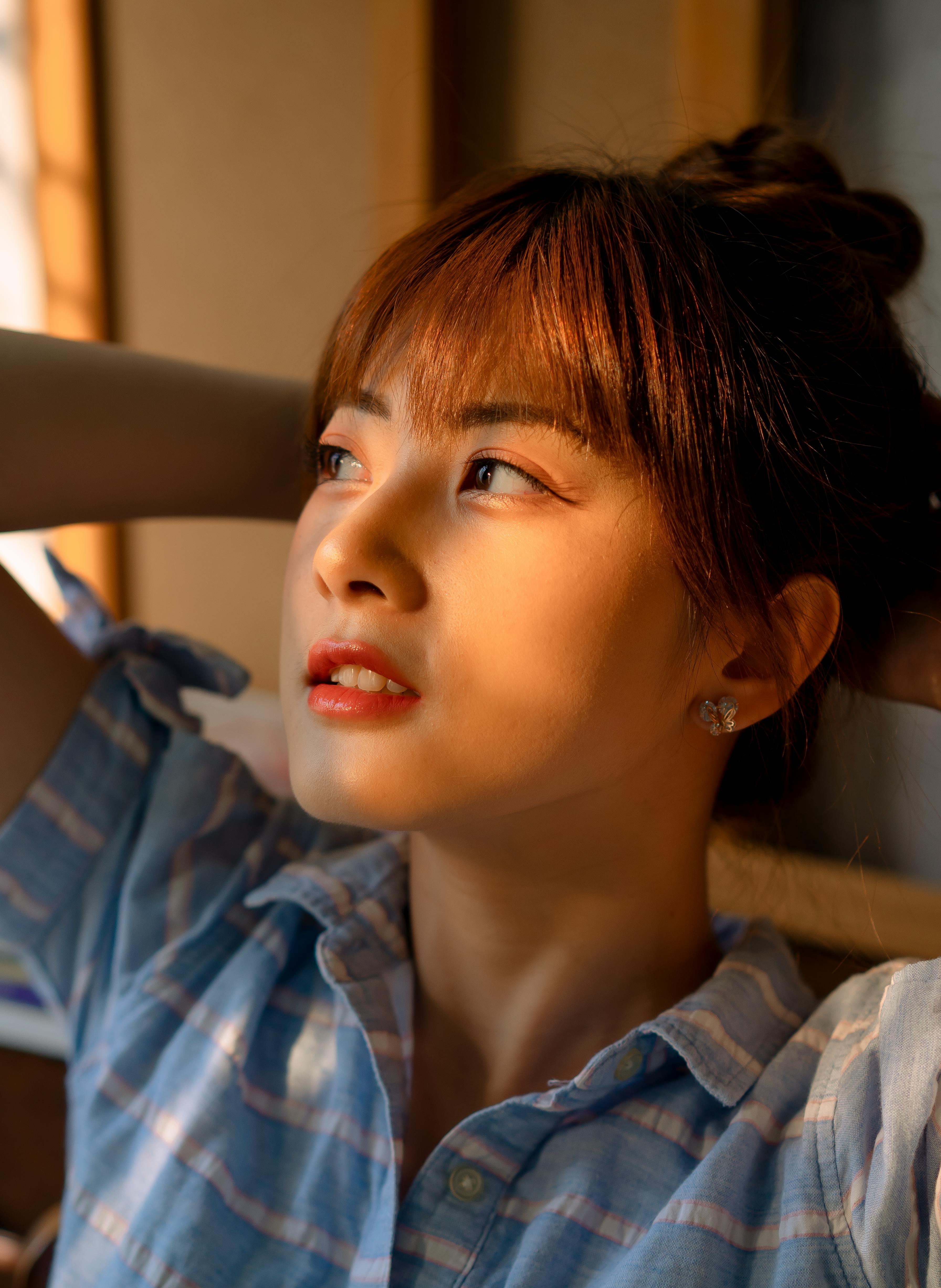 Girl Holding a Basket of Yams · Free Stock Photo