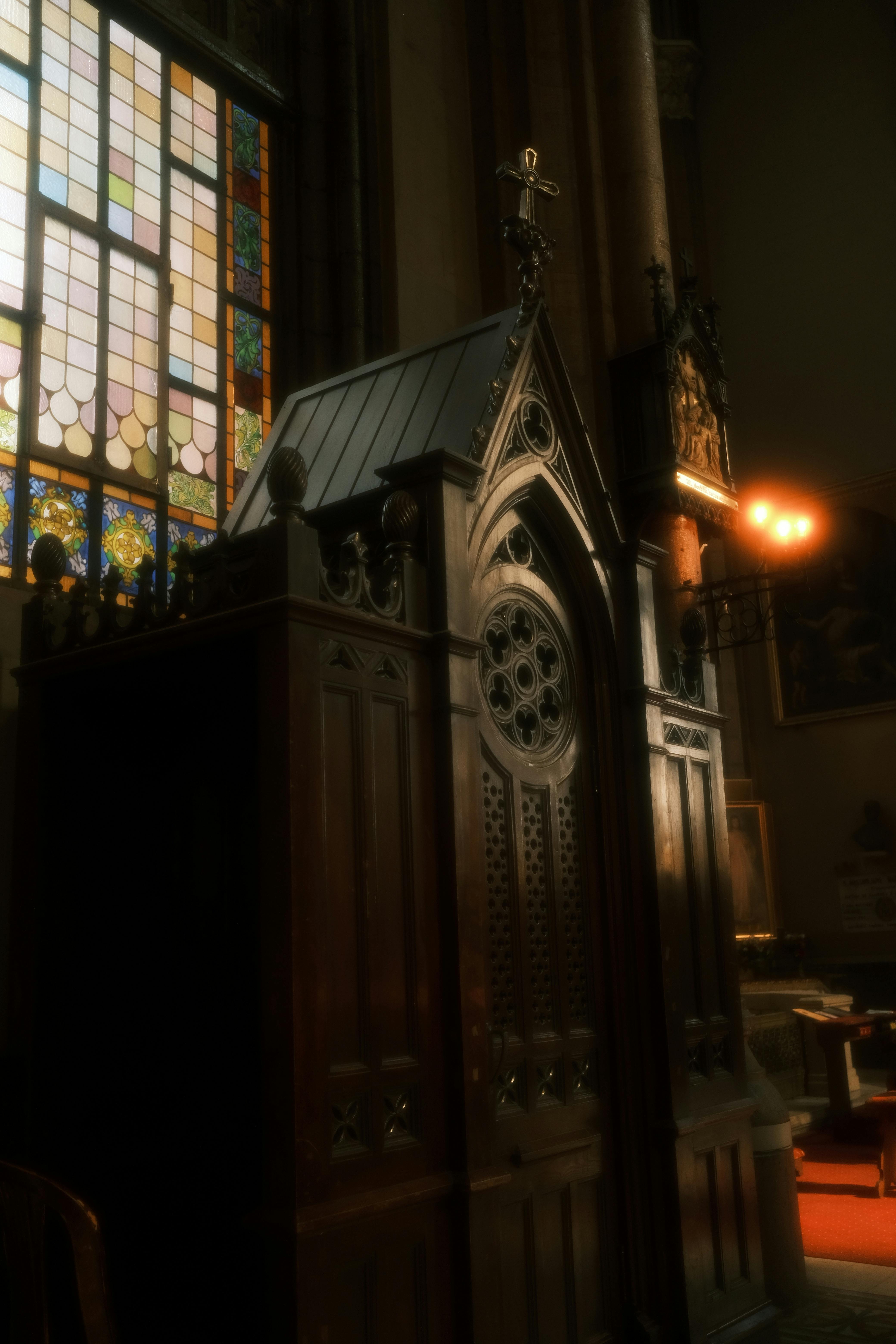 Wooden Confessional and a Stained Glass Window in a Church · Free Stock ...
