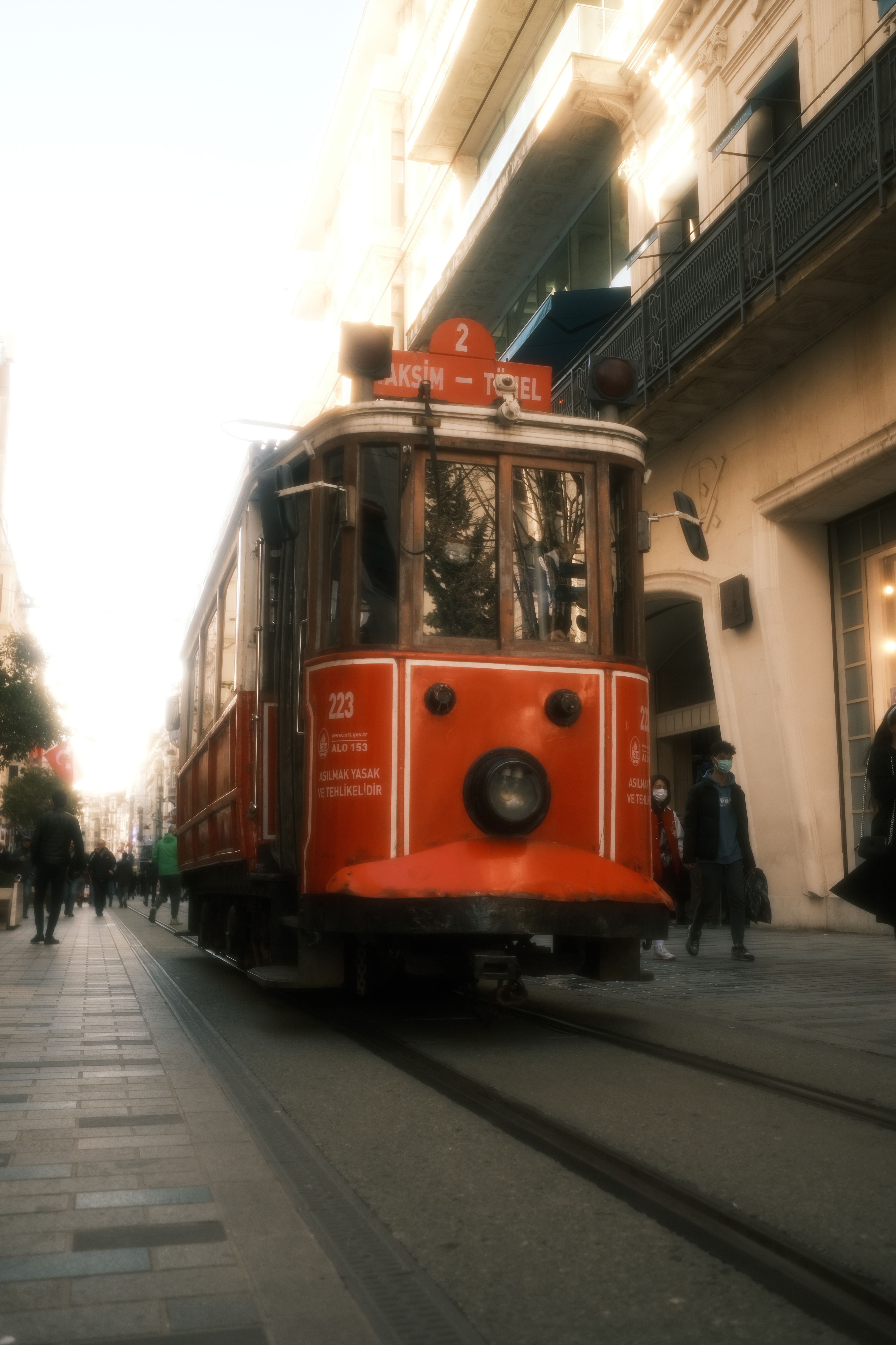 Tram Driving through Snowy Park · Free Stock Photo