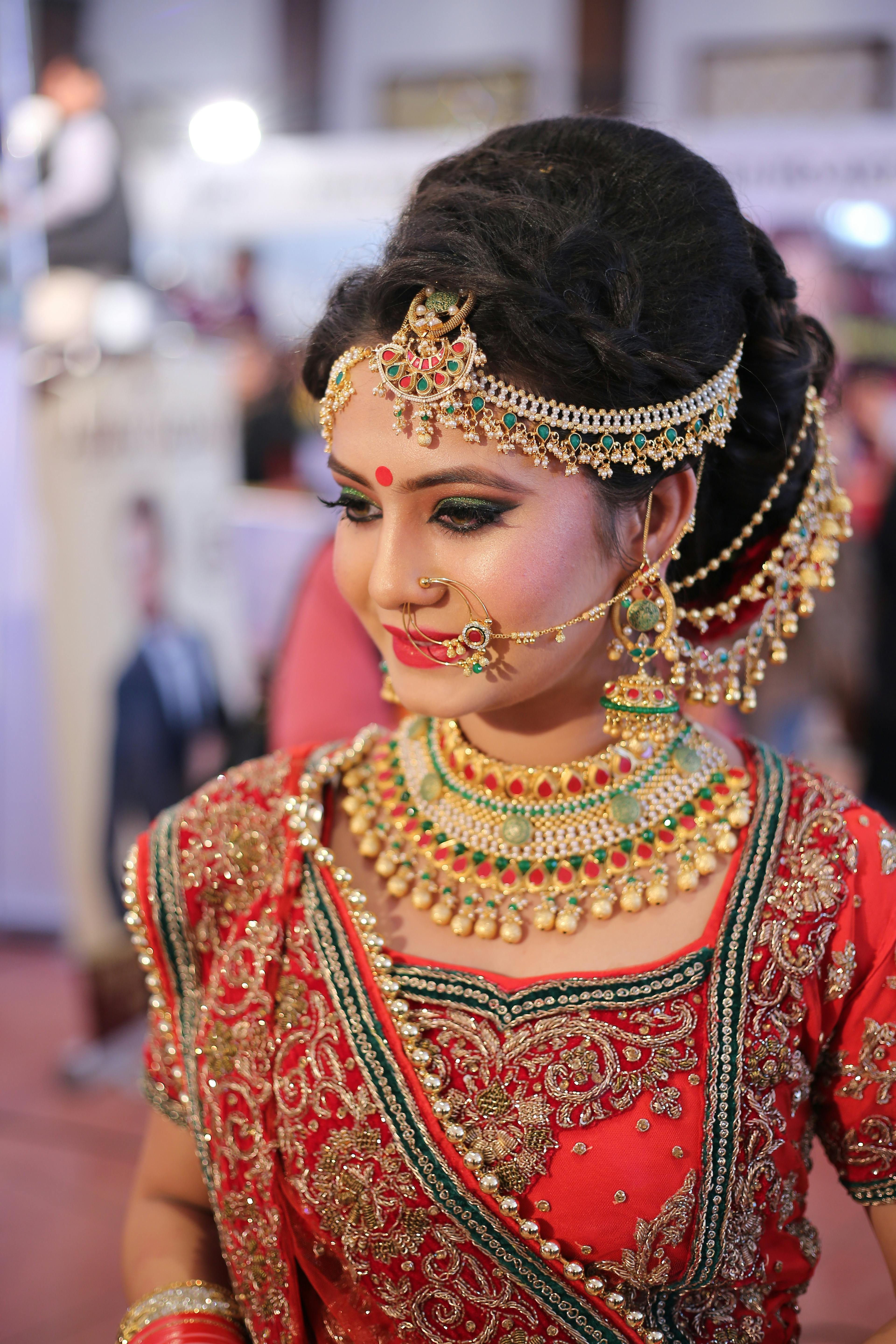 Woman in Red and Gold Floral Dress · Free Stock Photo