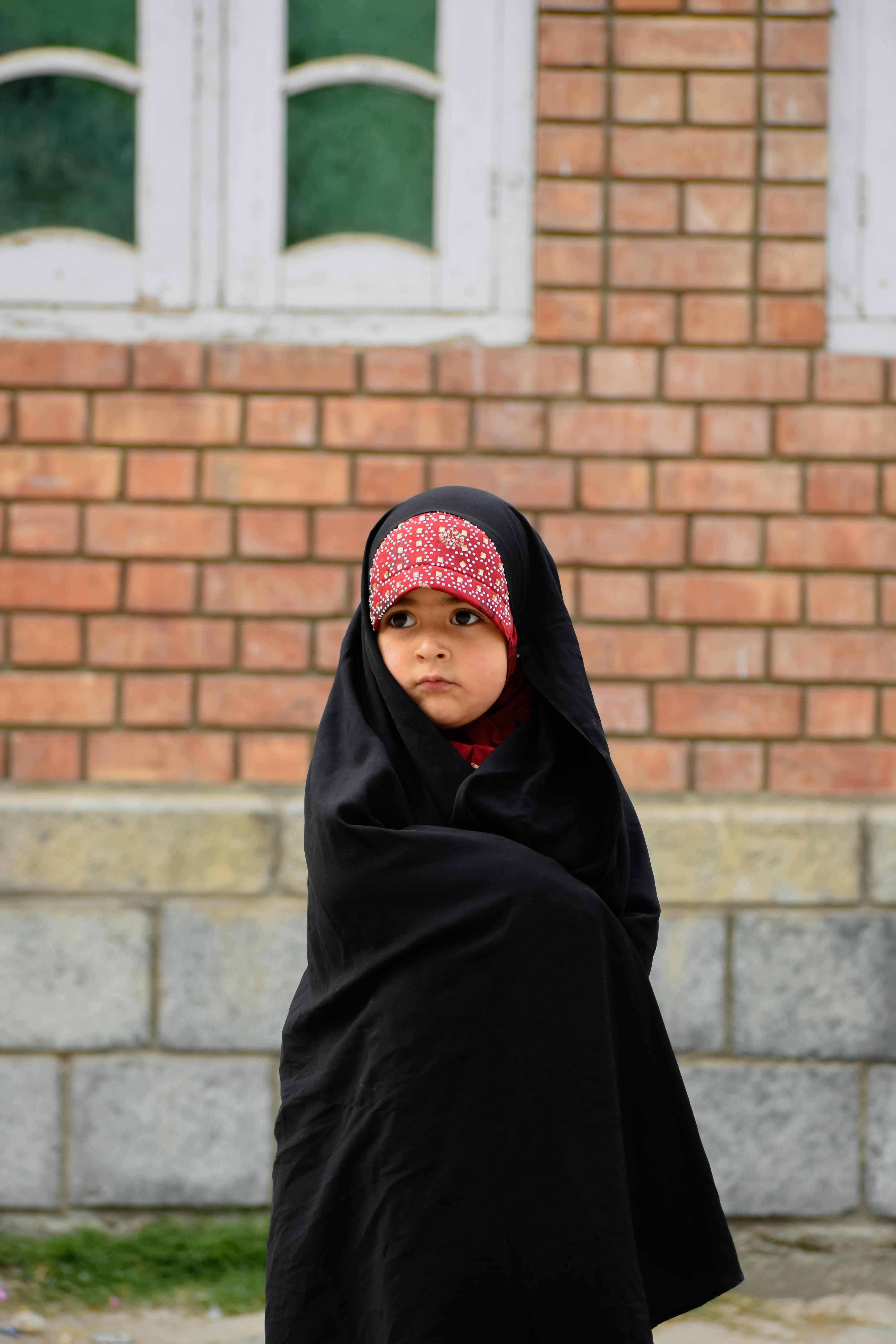 Girl Posing in Hijab and Traditional Clothing · Free Stock Photo
