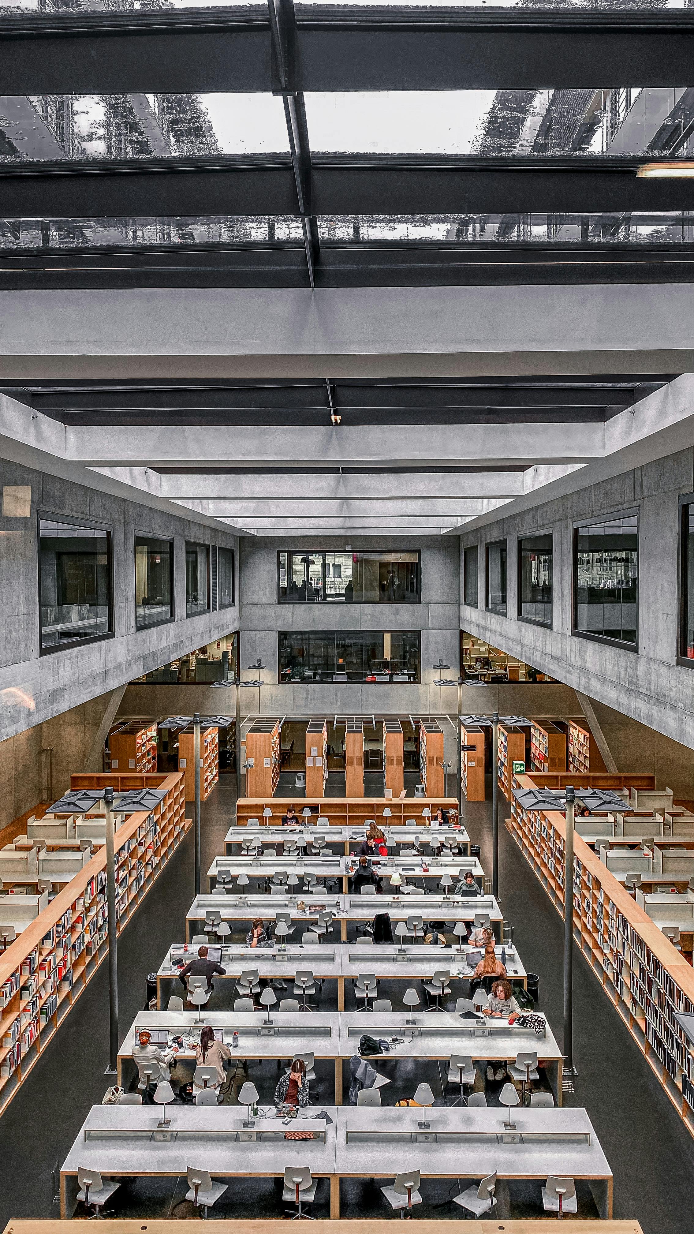 Brown Wooden Tables and Chairs Inside a University Library · Free Stock ...