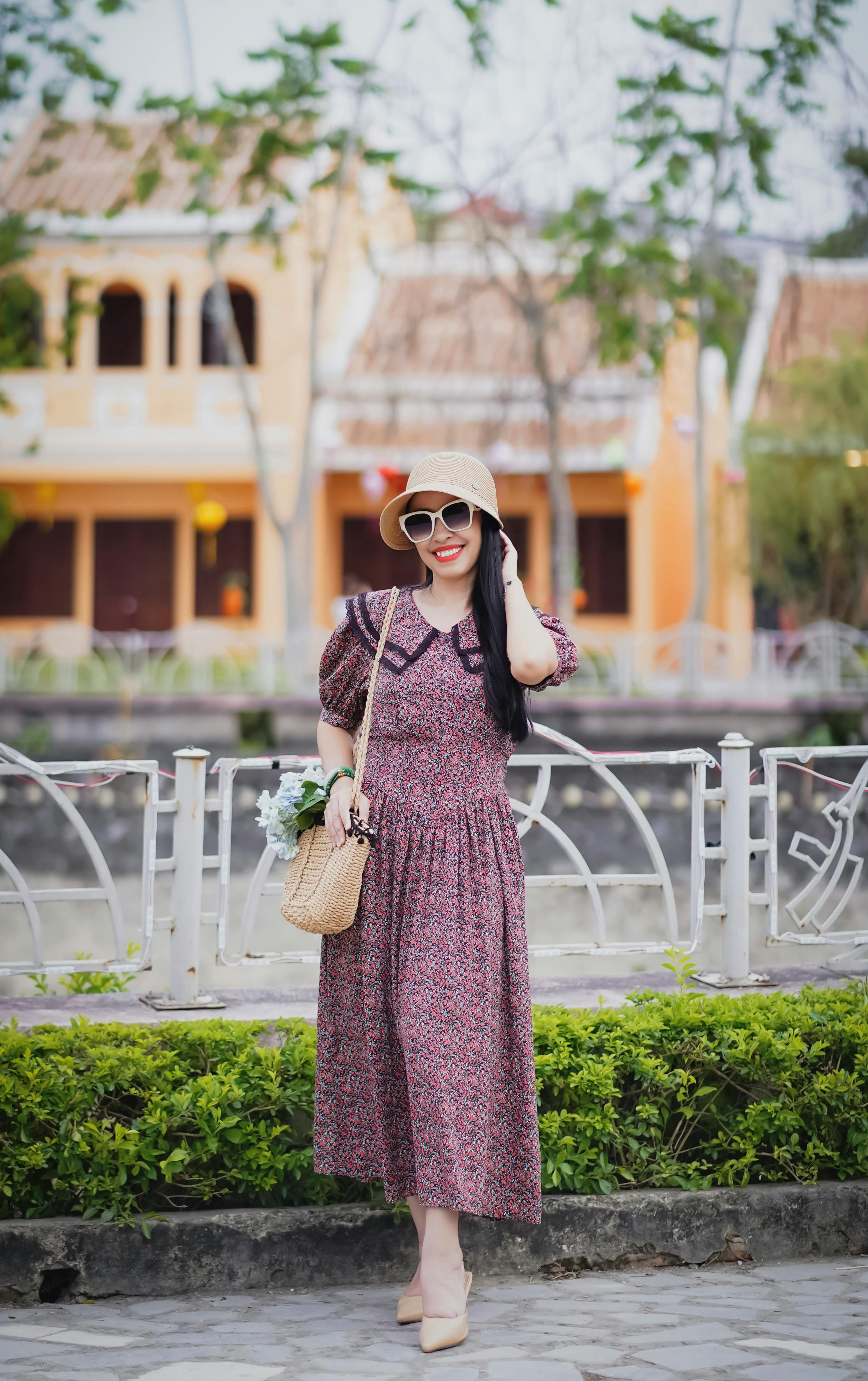Woman in Red Jacket Holding Hoe · Free Stock Photo