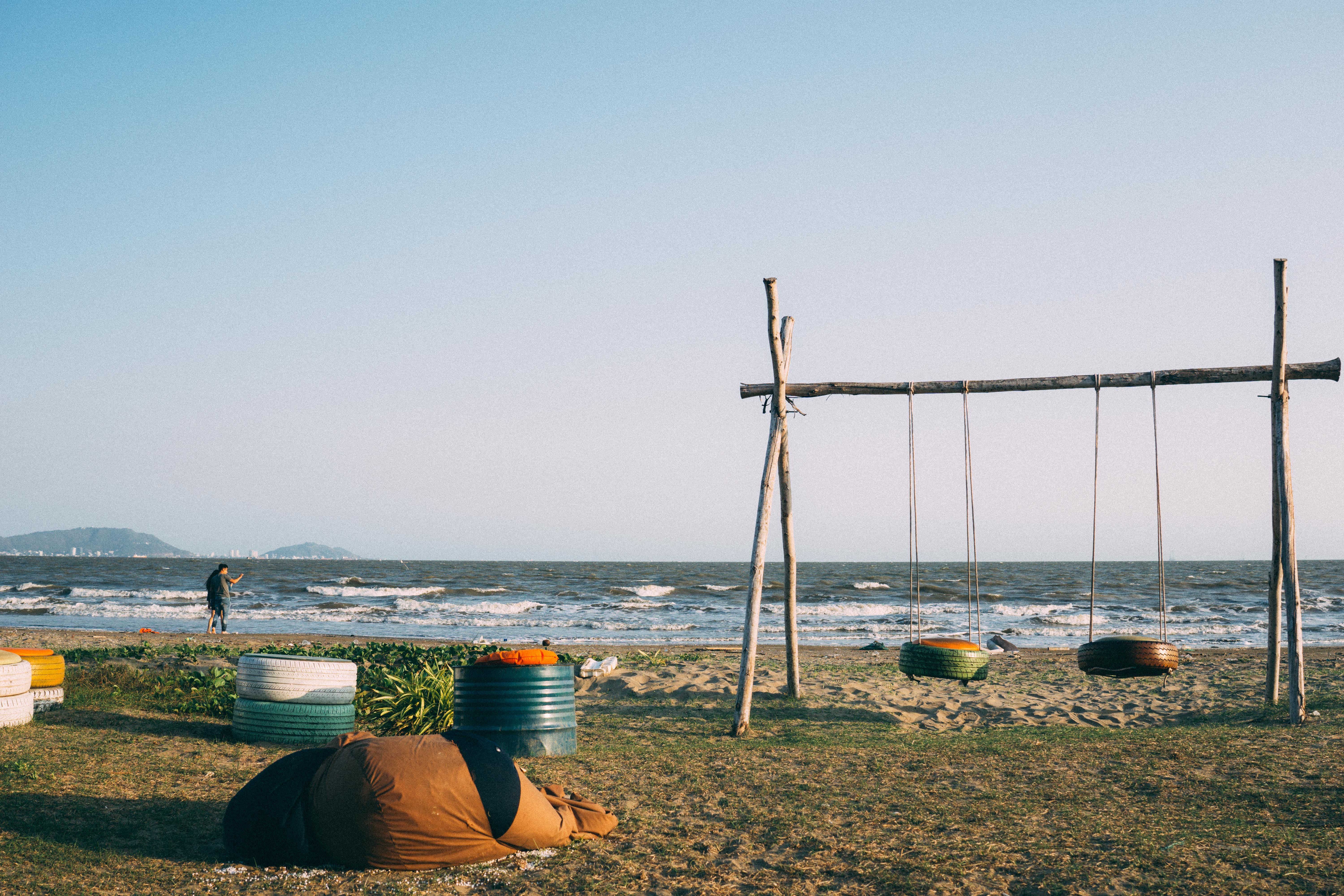 Wooden Swing on Seashore · Free Stock Photo