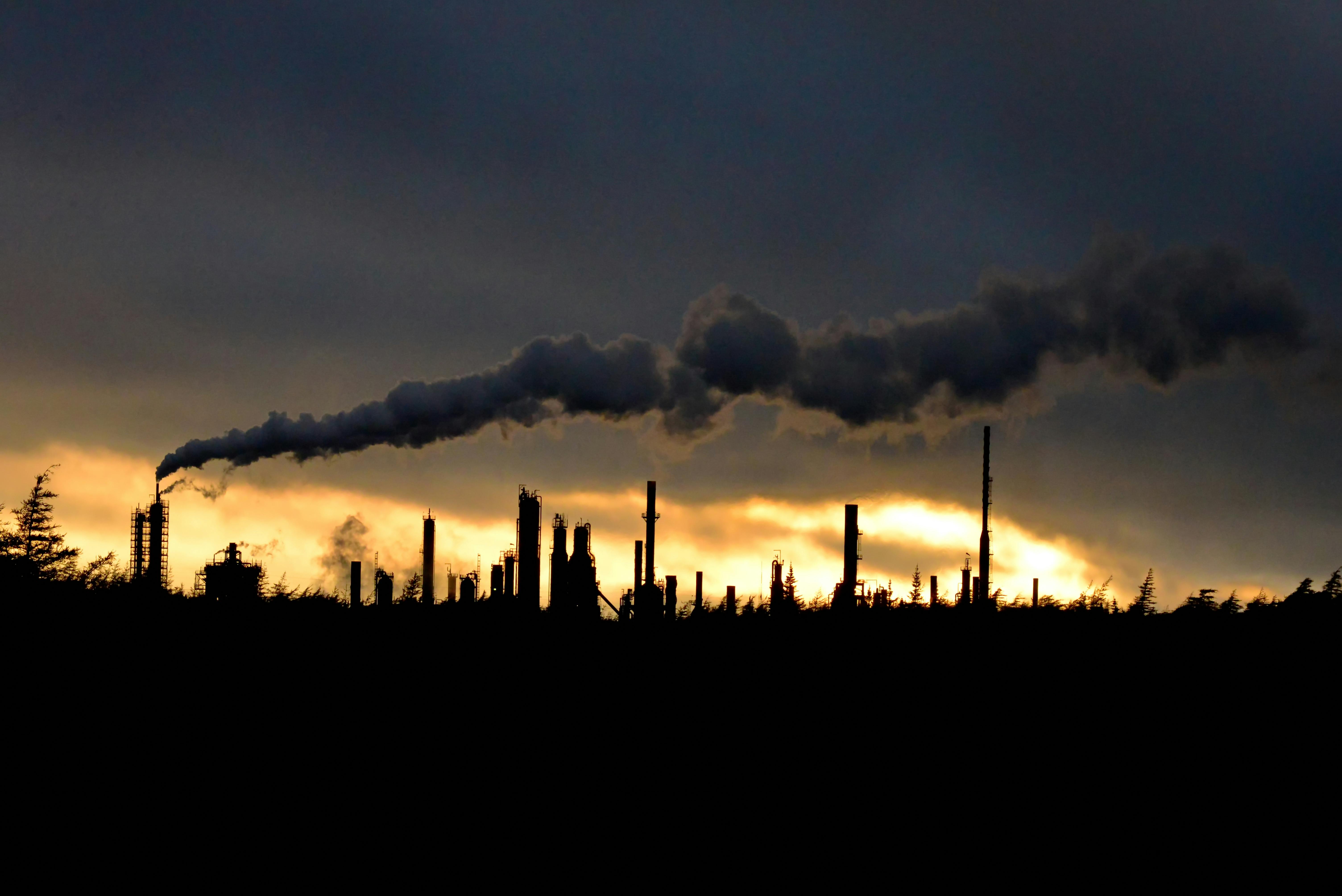 Clouds over Factory Chimneys · Free Stock Photo