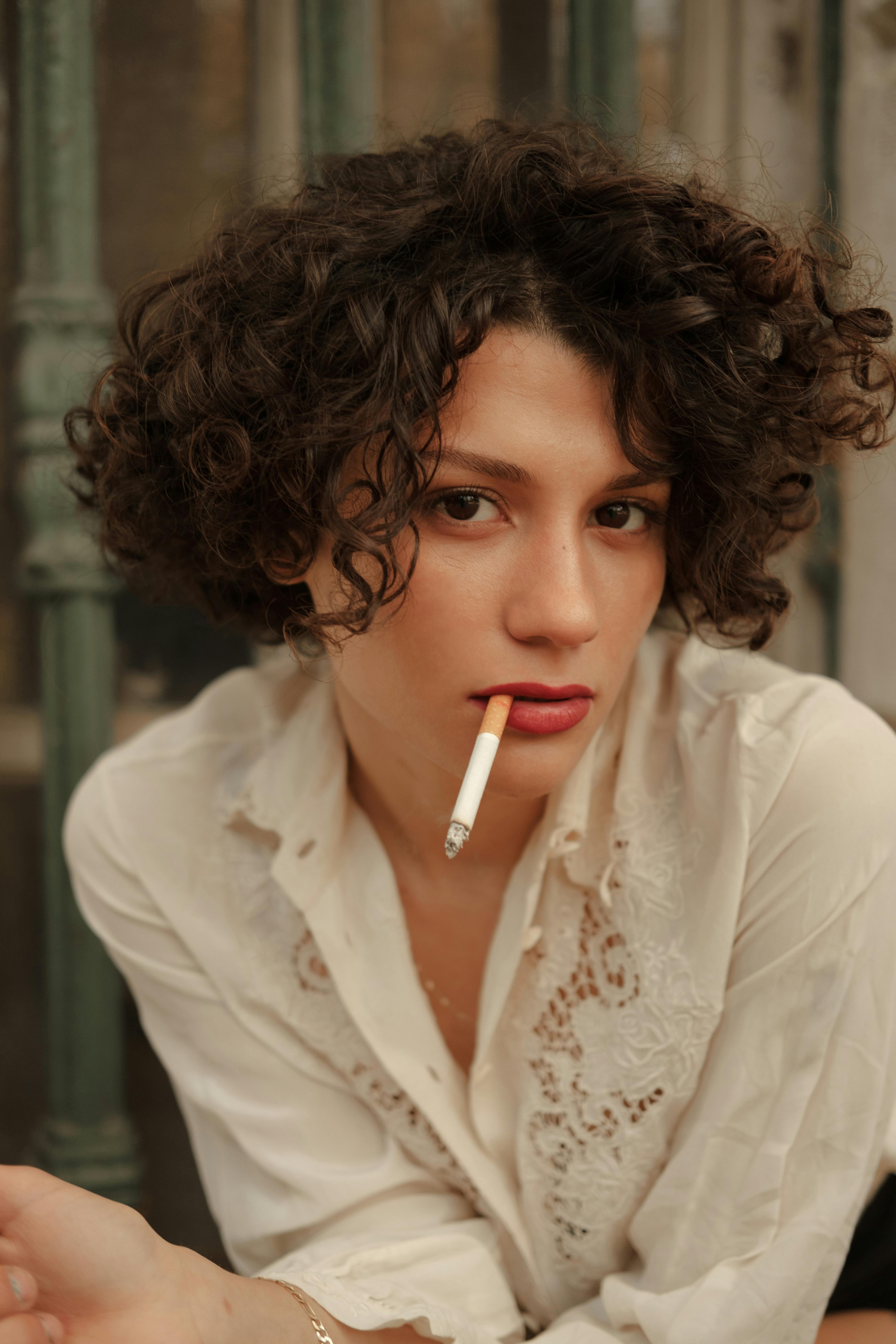 A Woman Smoking Cigarette · Free Stock Photo