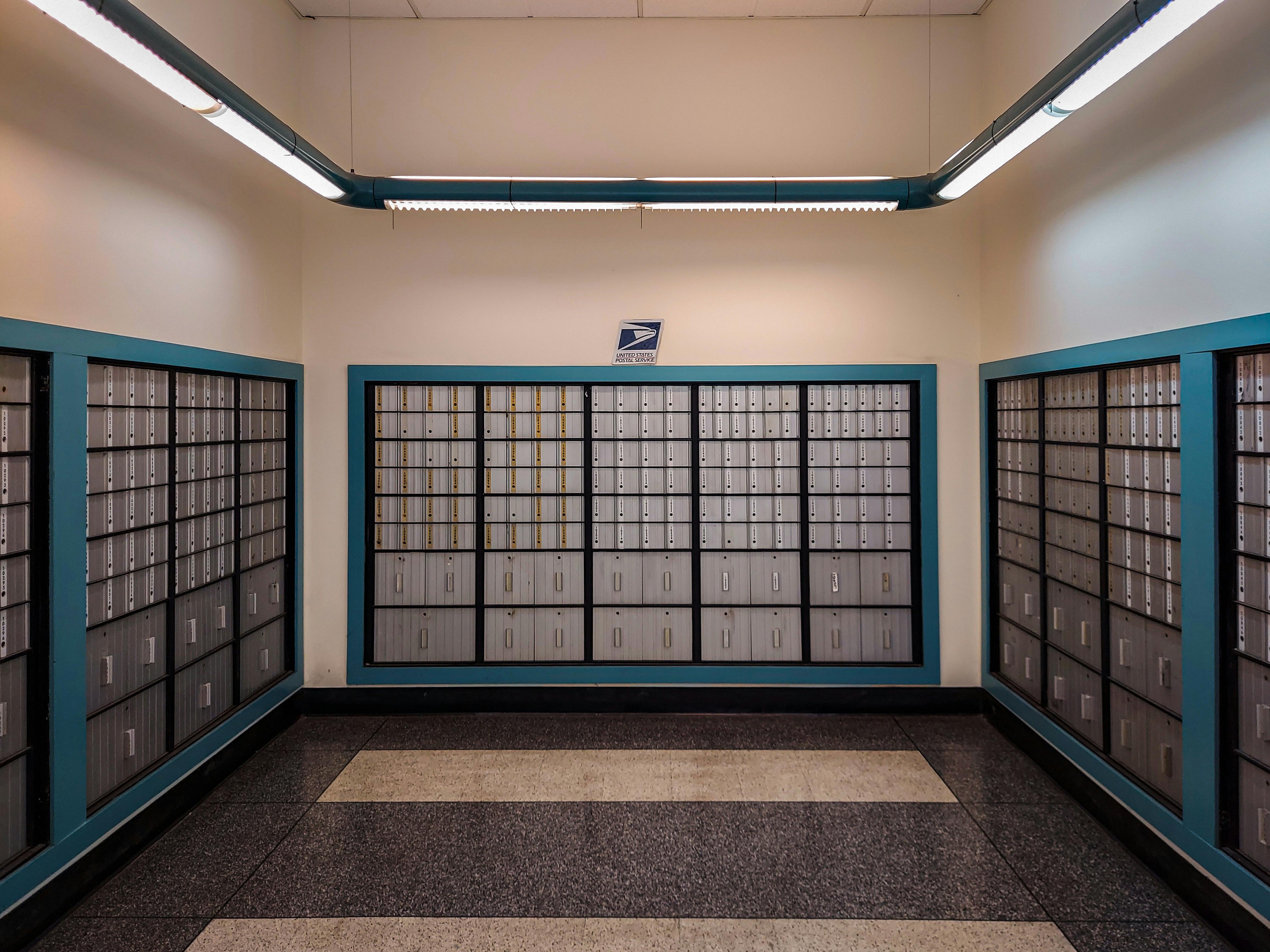 Grey Metal Lockers Is Open · Free Stock Photo