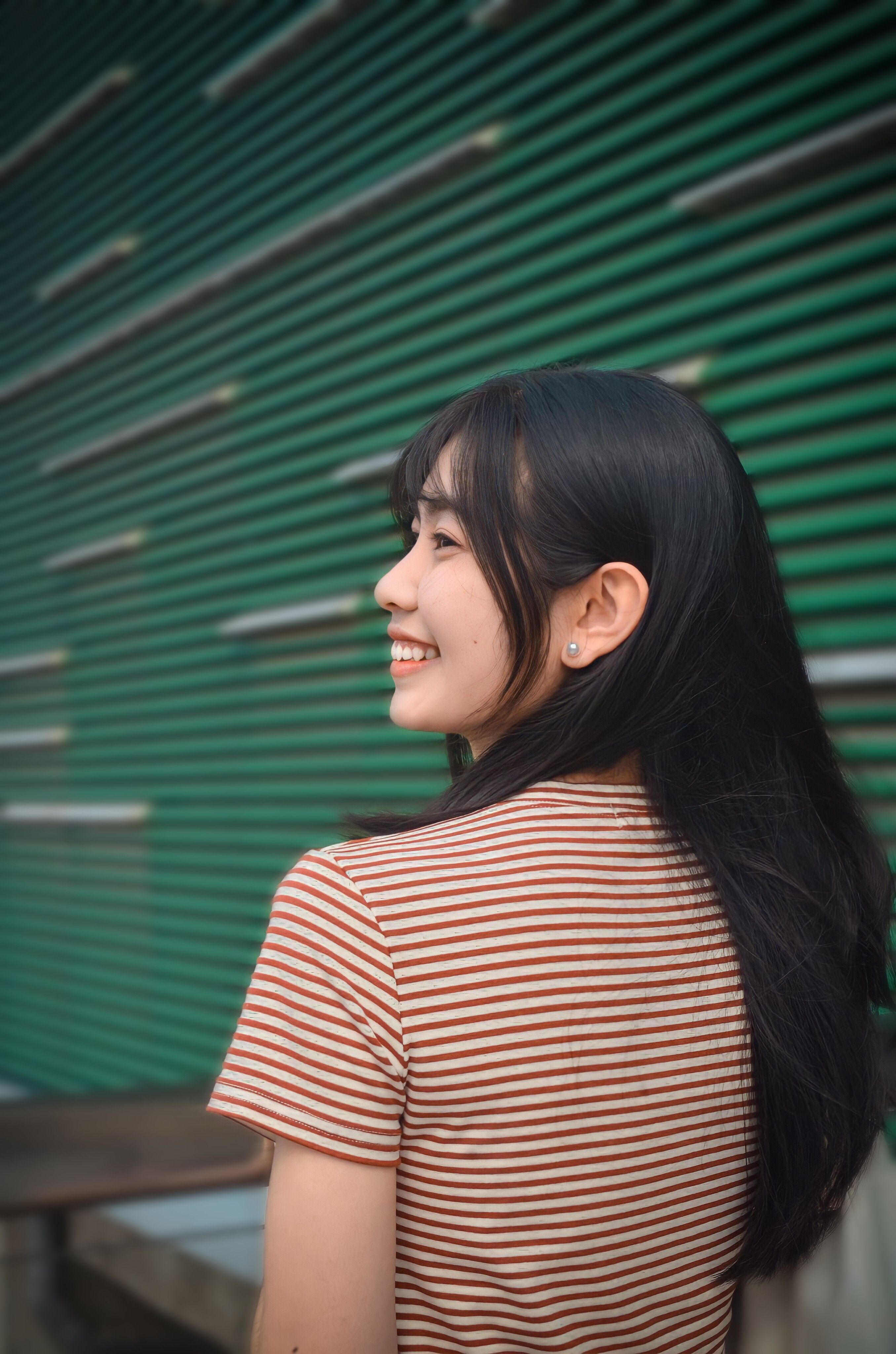 Side View of a Smiling Woman · Free Stock Photo