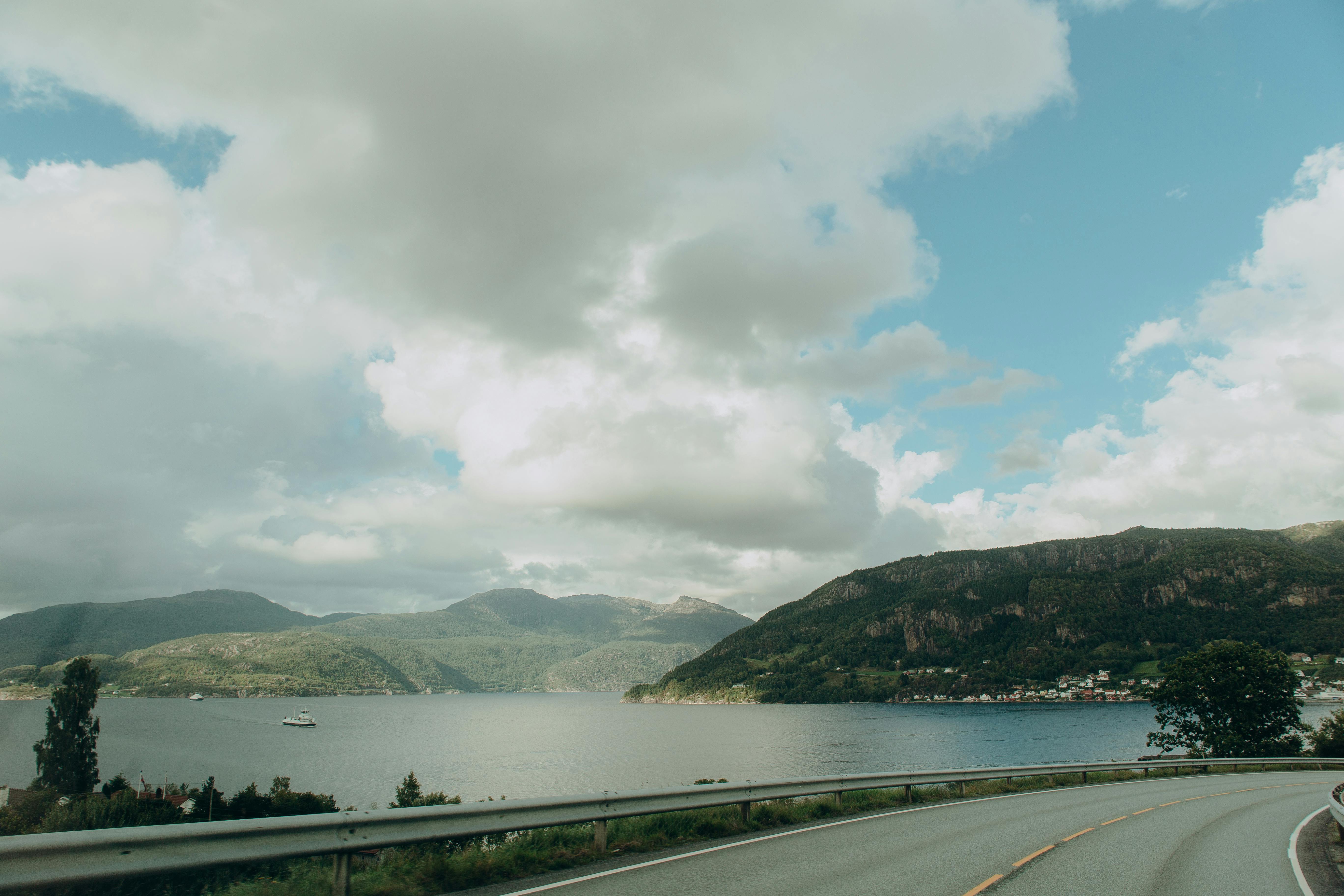 One Lane Road Passing Through the Mountains · Free Stock Photo