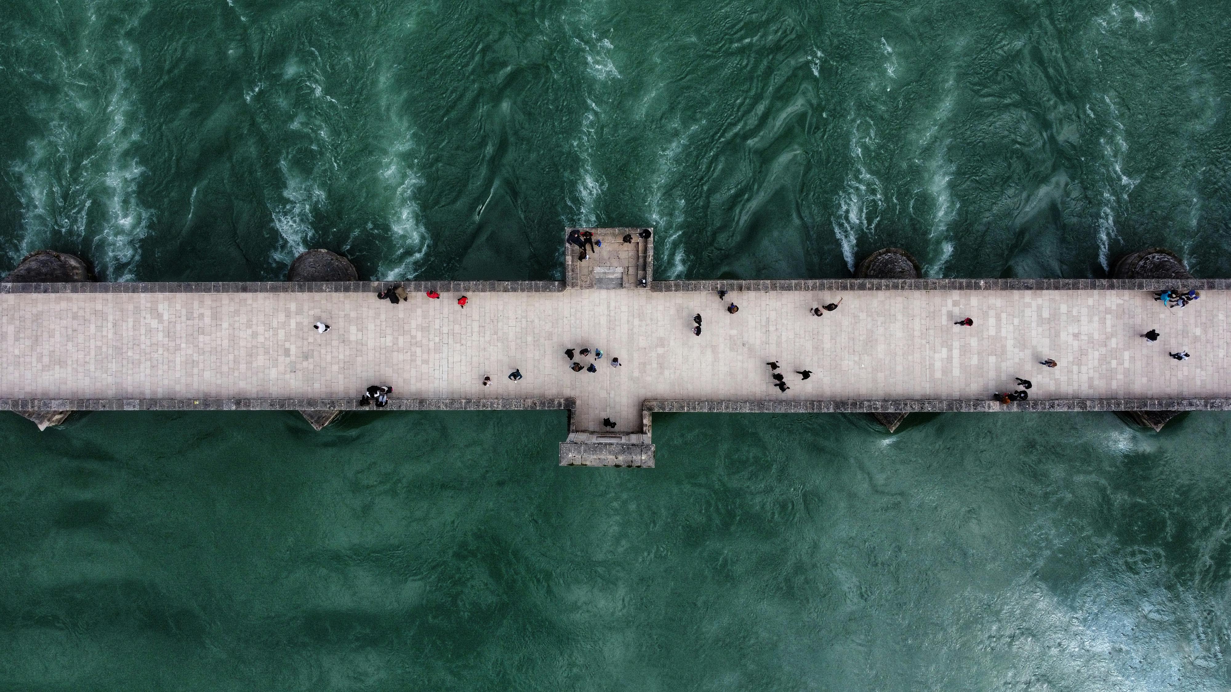 Top View of People Walking Along the Pier · Free Stock Photo