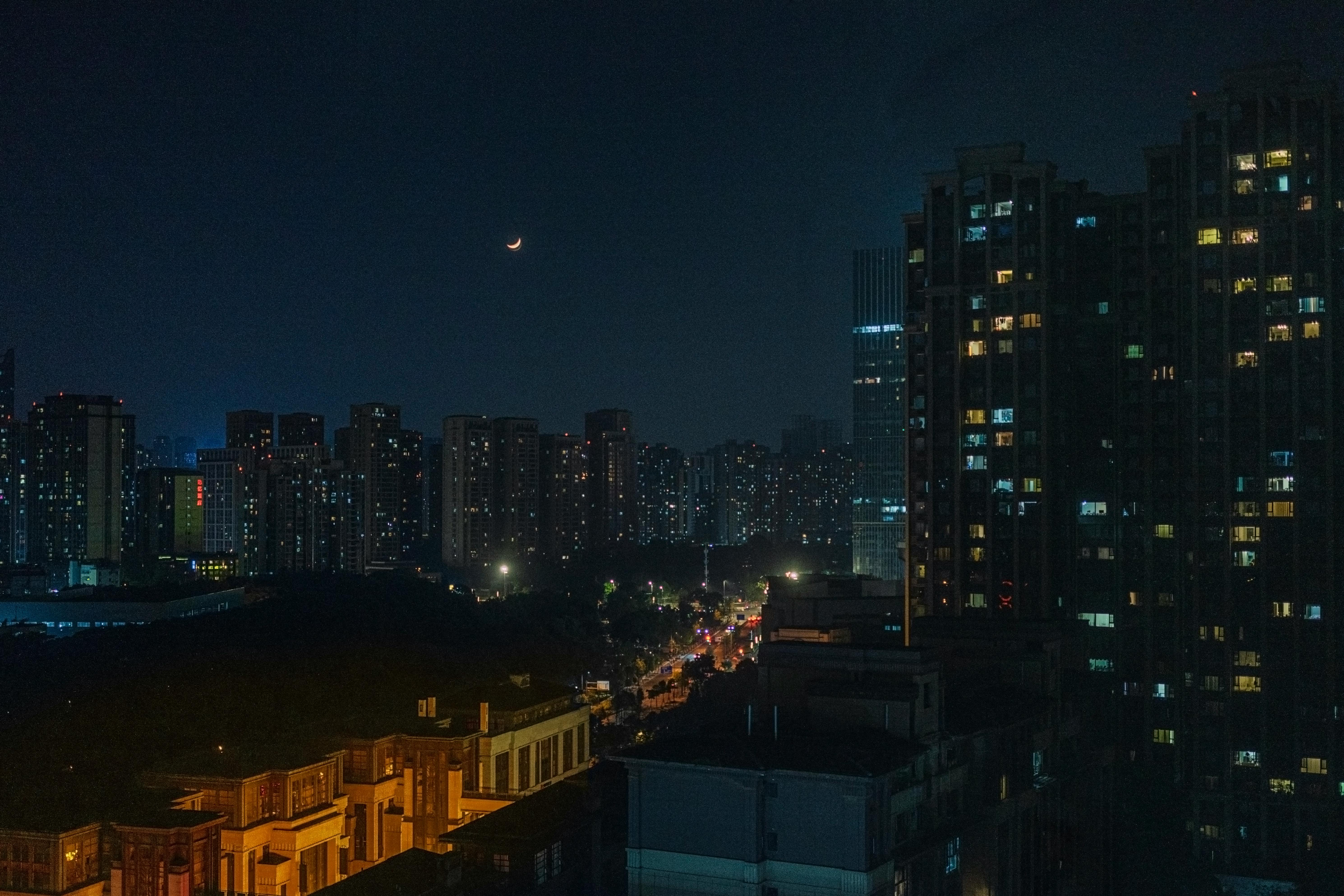 Photo of City Buildings During Night Time · Free Stock Photo