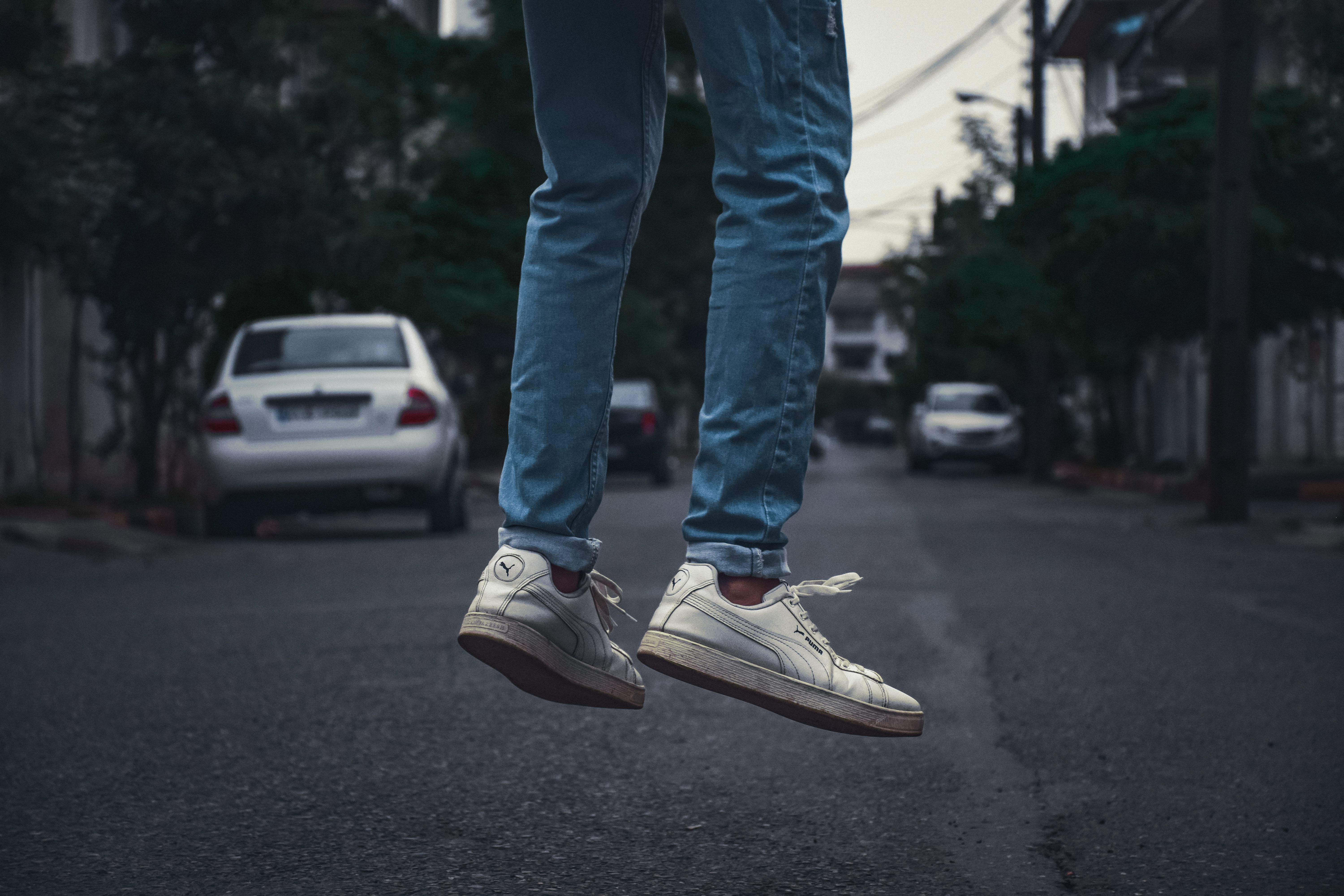 Man in Black White Nike Shoes during Nighttime · Free Stock Photo