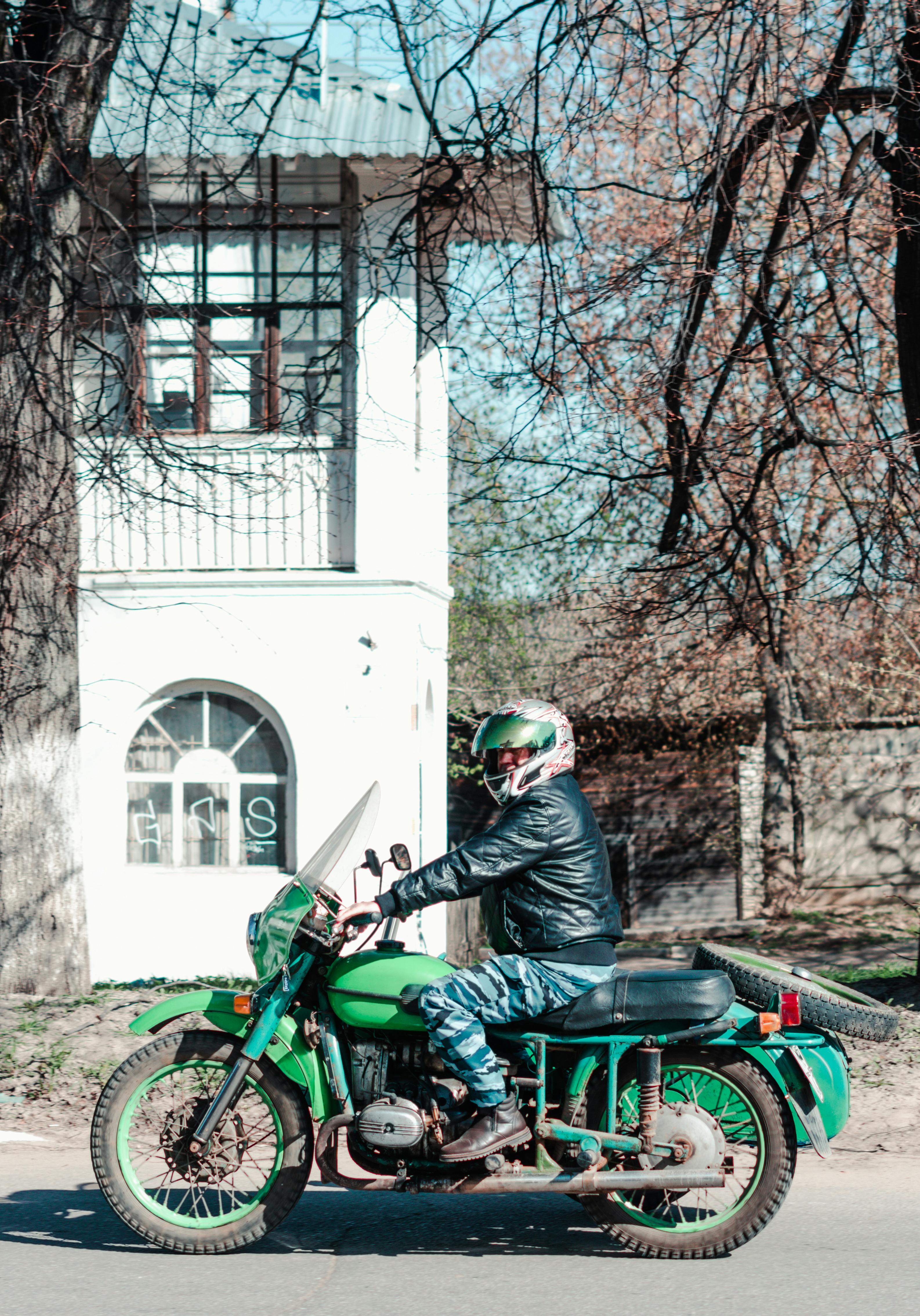 Man Riding a Motorcycle · Free Stock Photo
