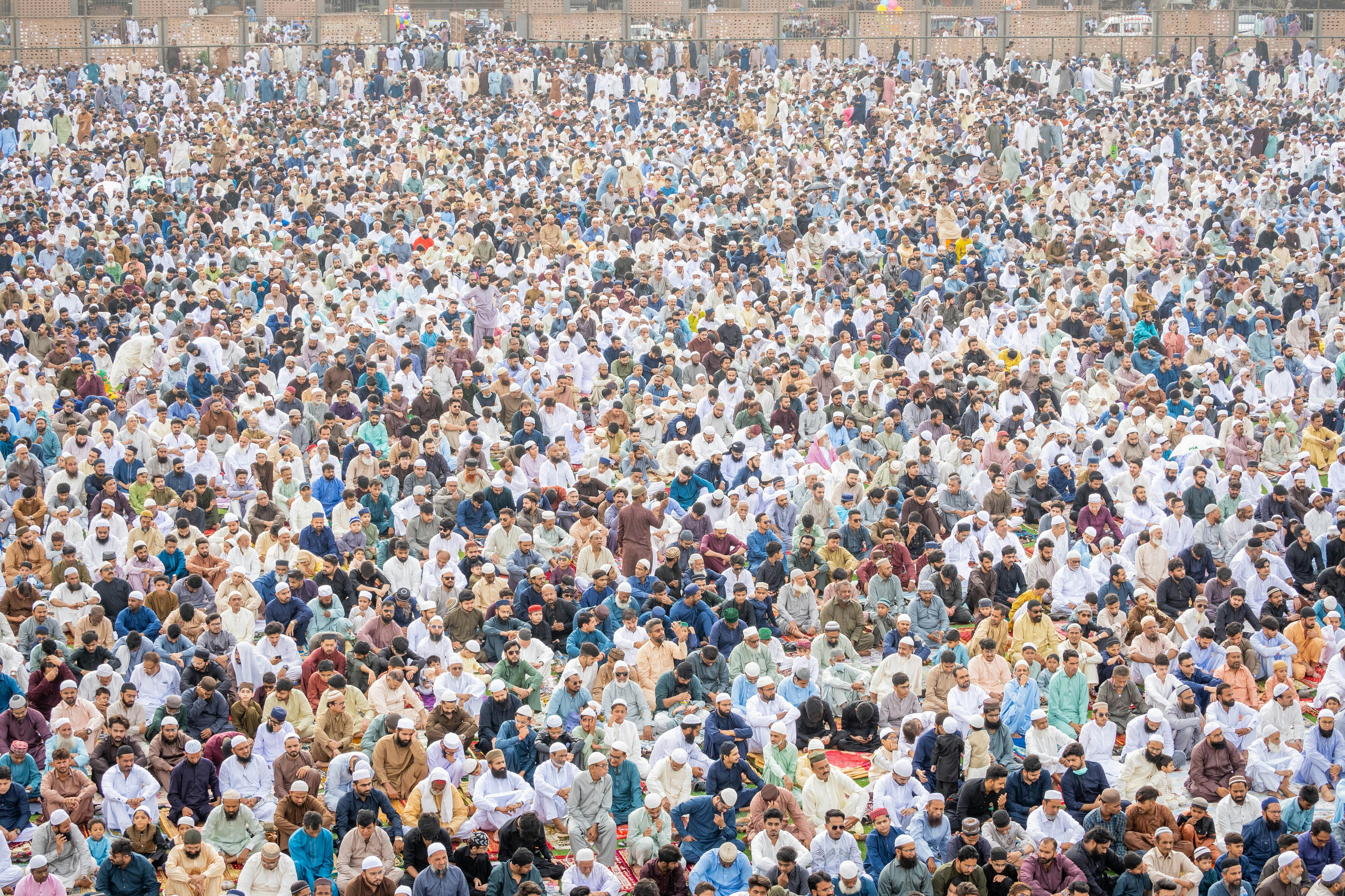 Crowd of Muslim People Praying · Free Stock Photo