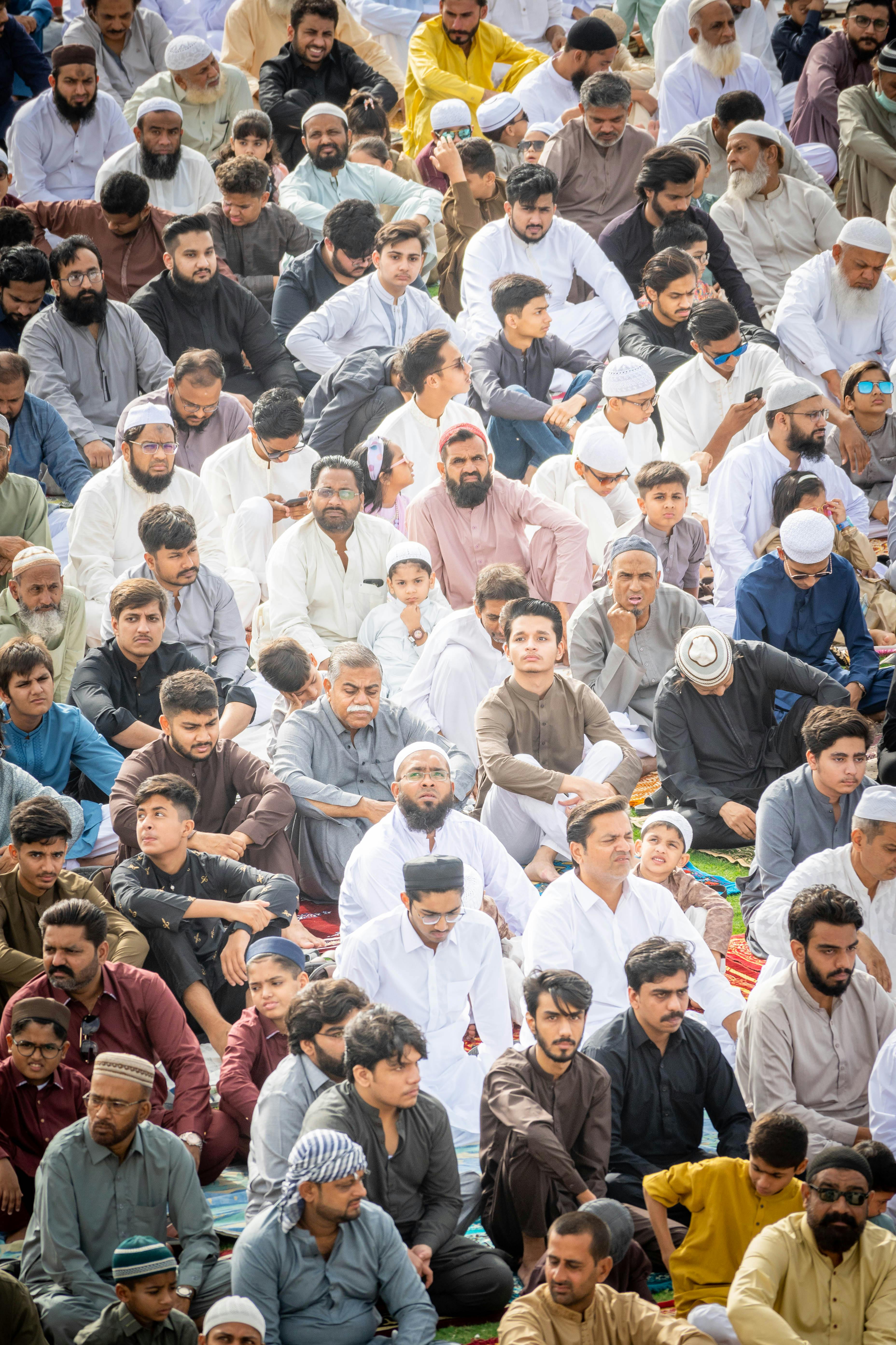 Crowd of Muslim People Praying · Free Stock Photo