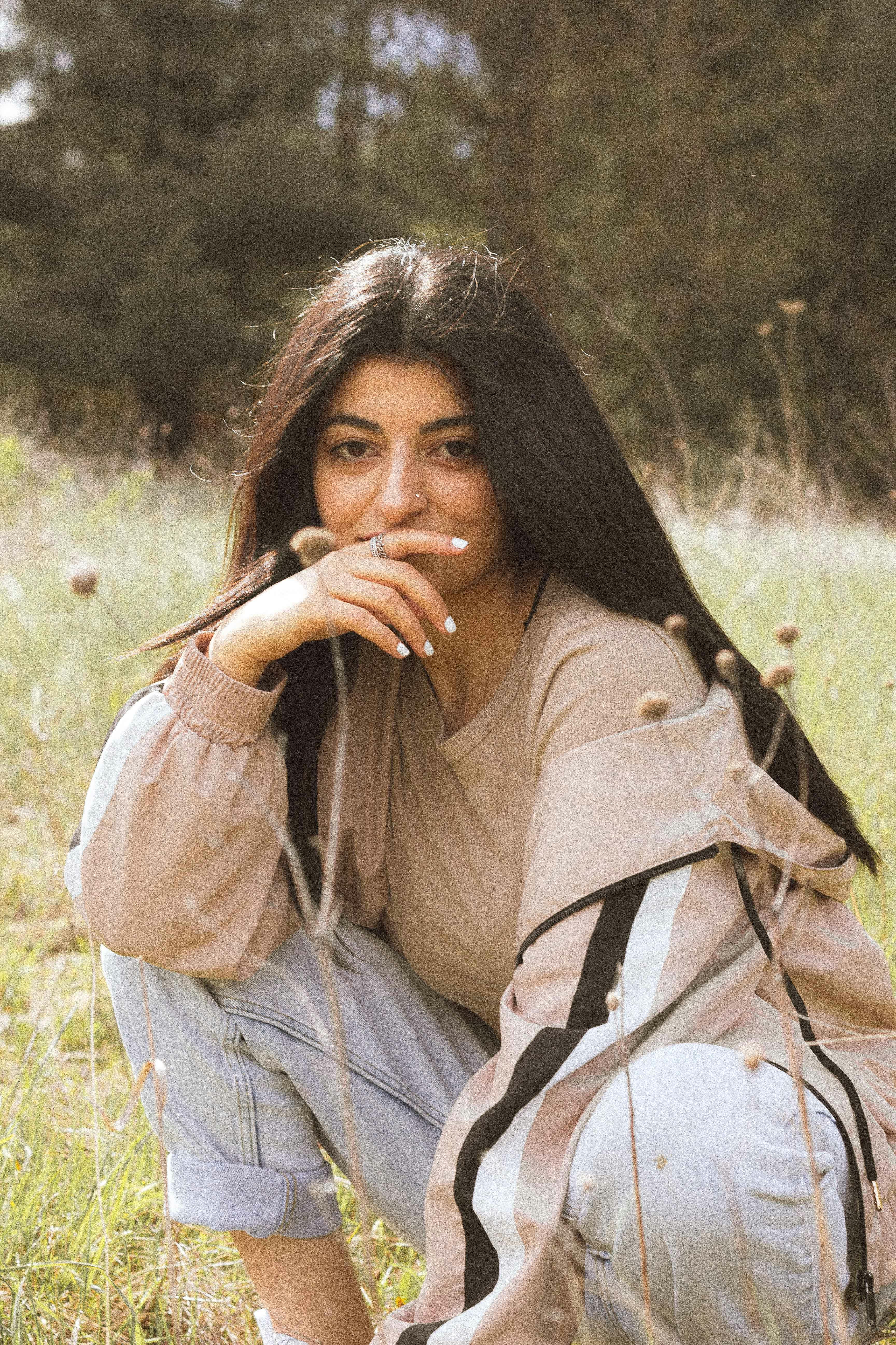 Woman Wearing a Jacket Posing · Free Stock Photo