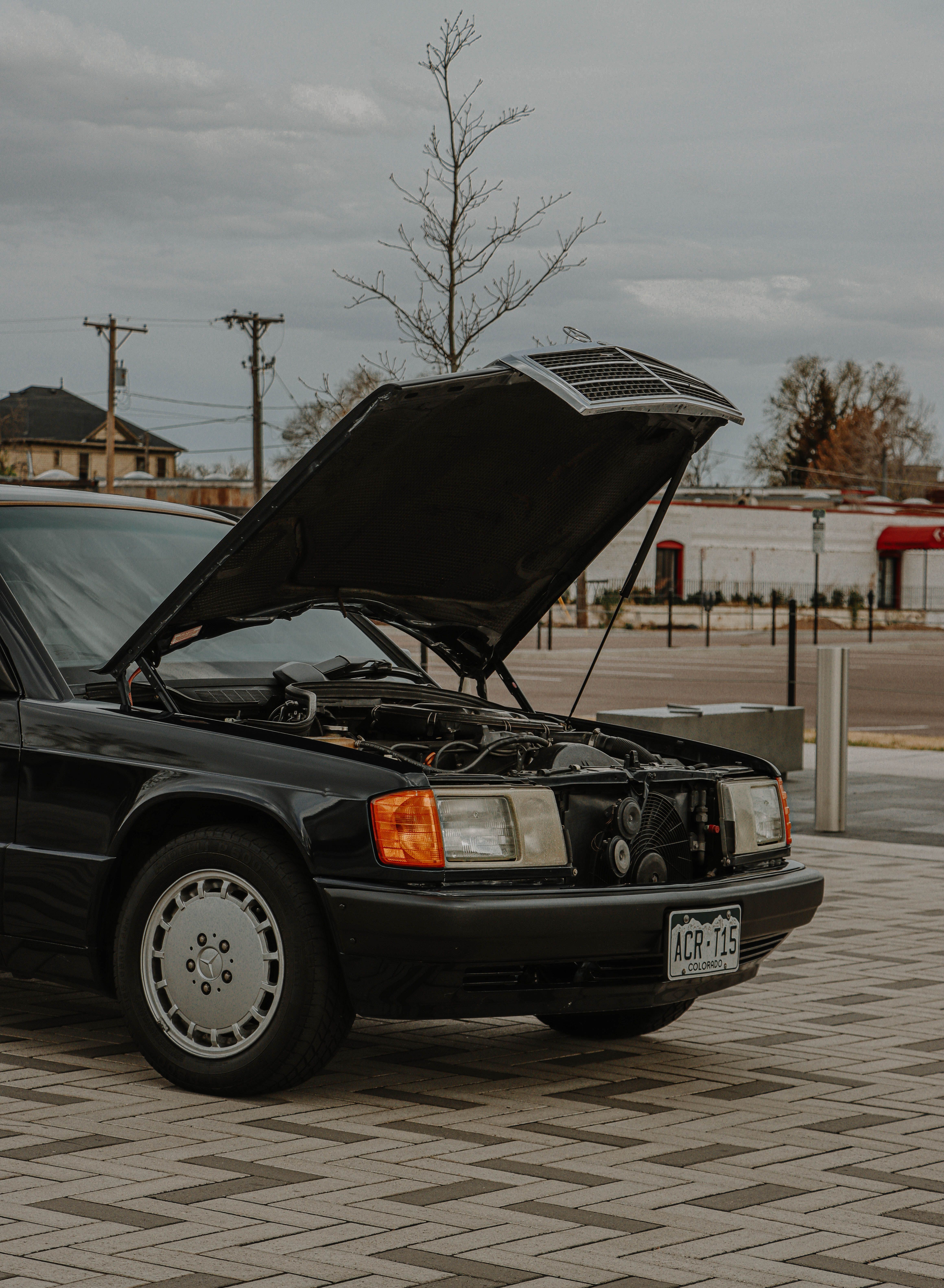 Black Car with an Open Hood · Free Stock Photo