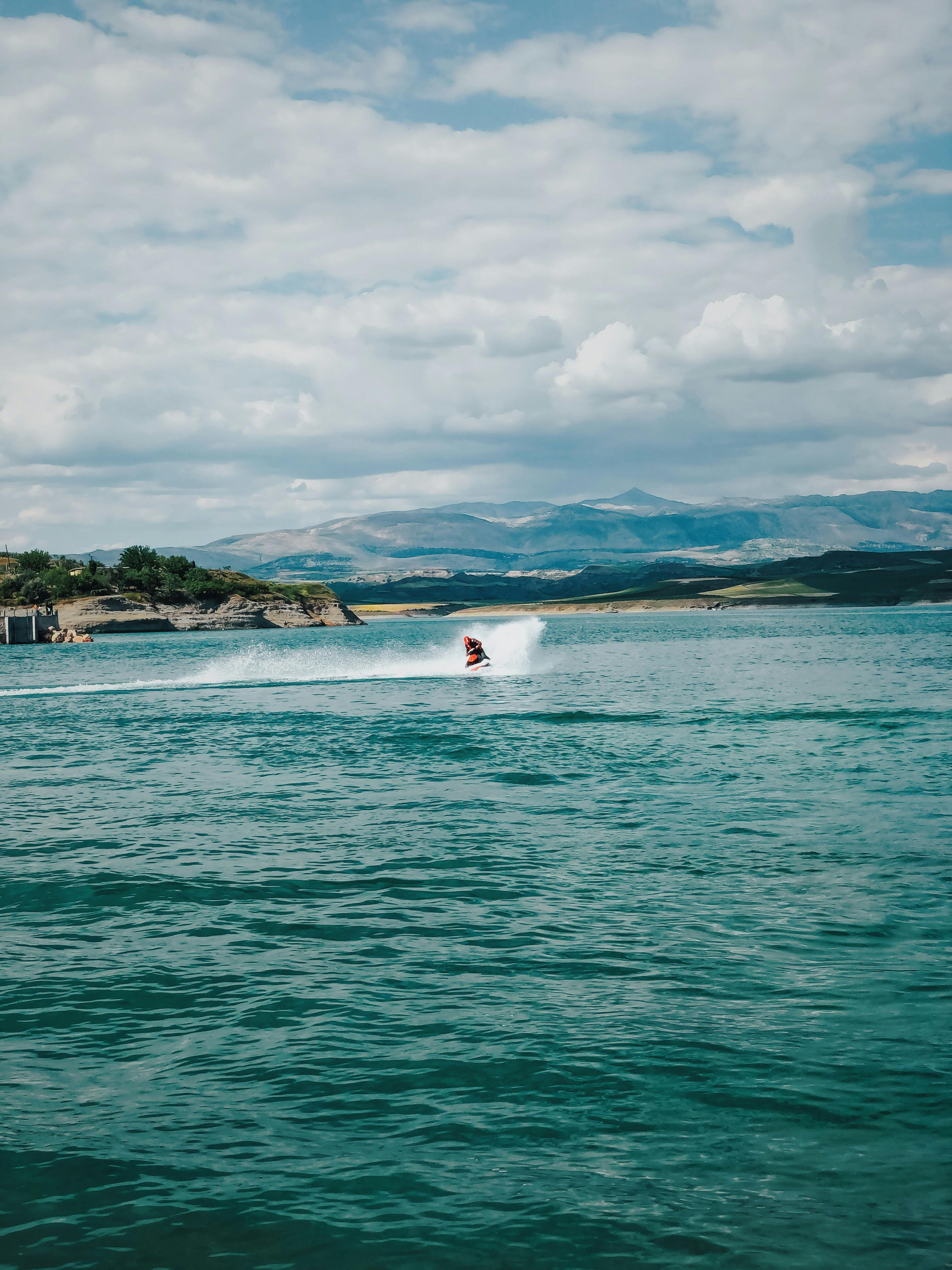 People Riding A Jet Ski · Free Stock Photo