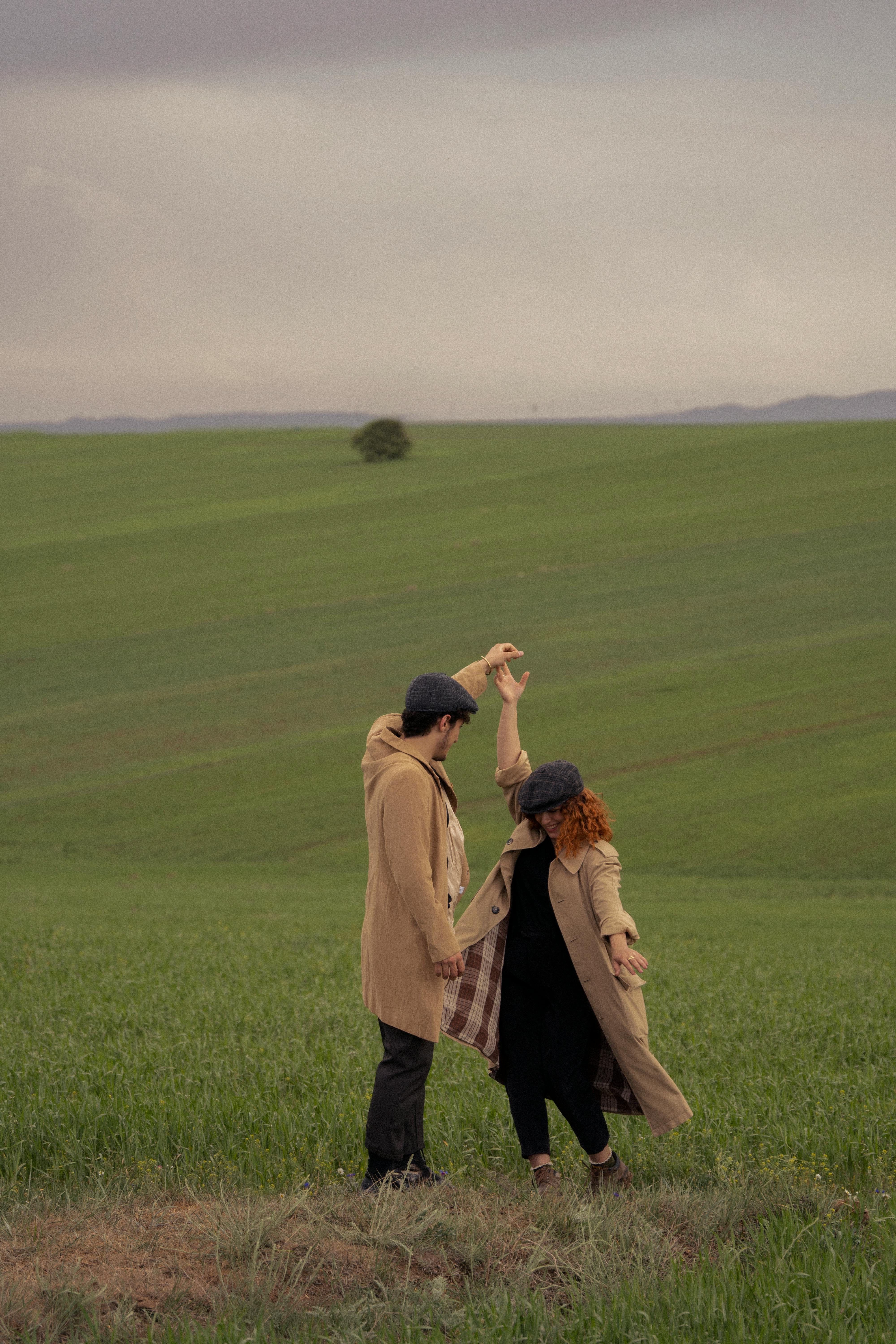 Couple Dancing in a Field · Free Stock Photo