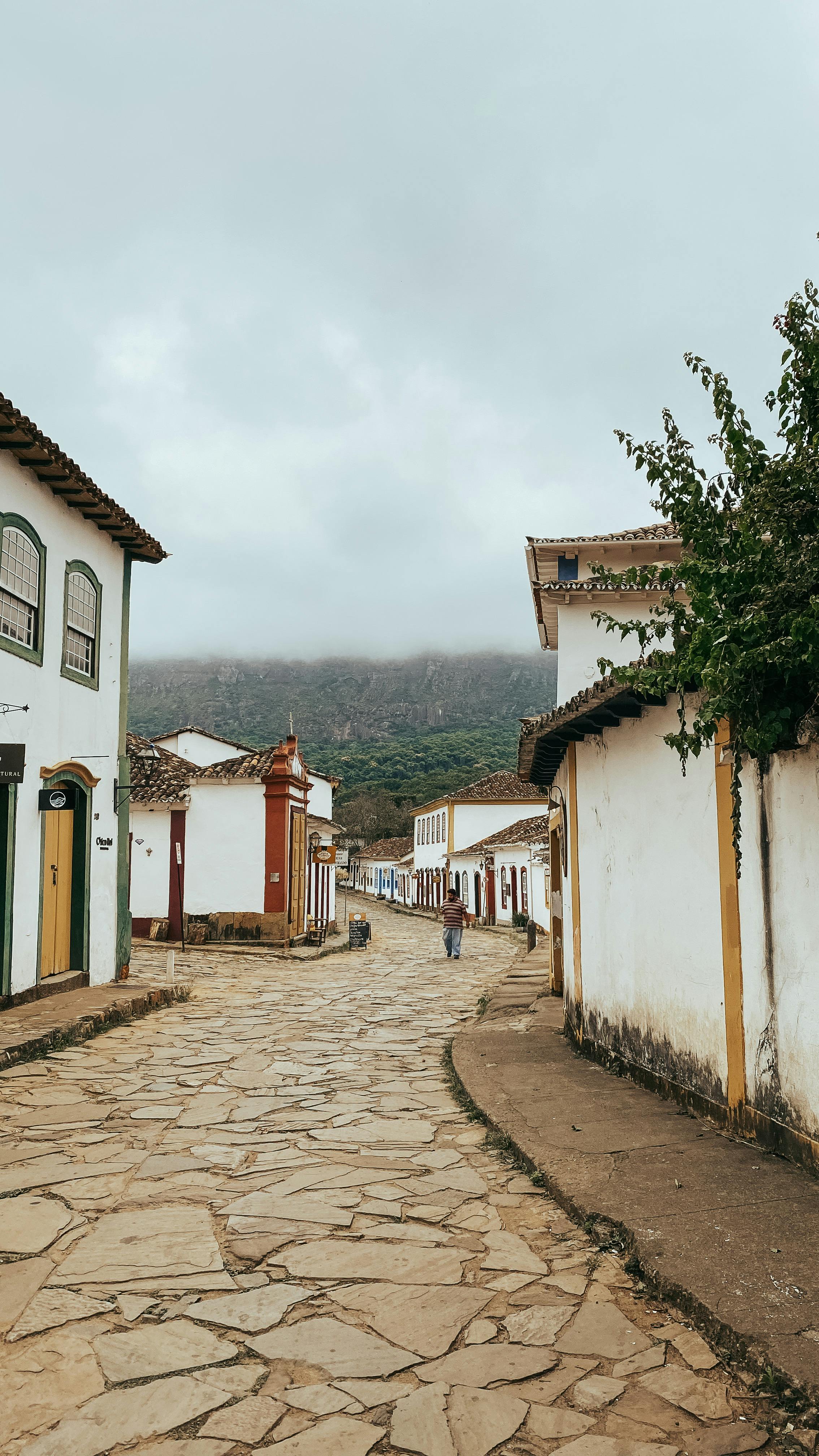 Empty Road Between Houses · Free Stock Photo