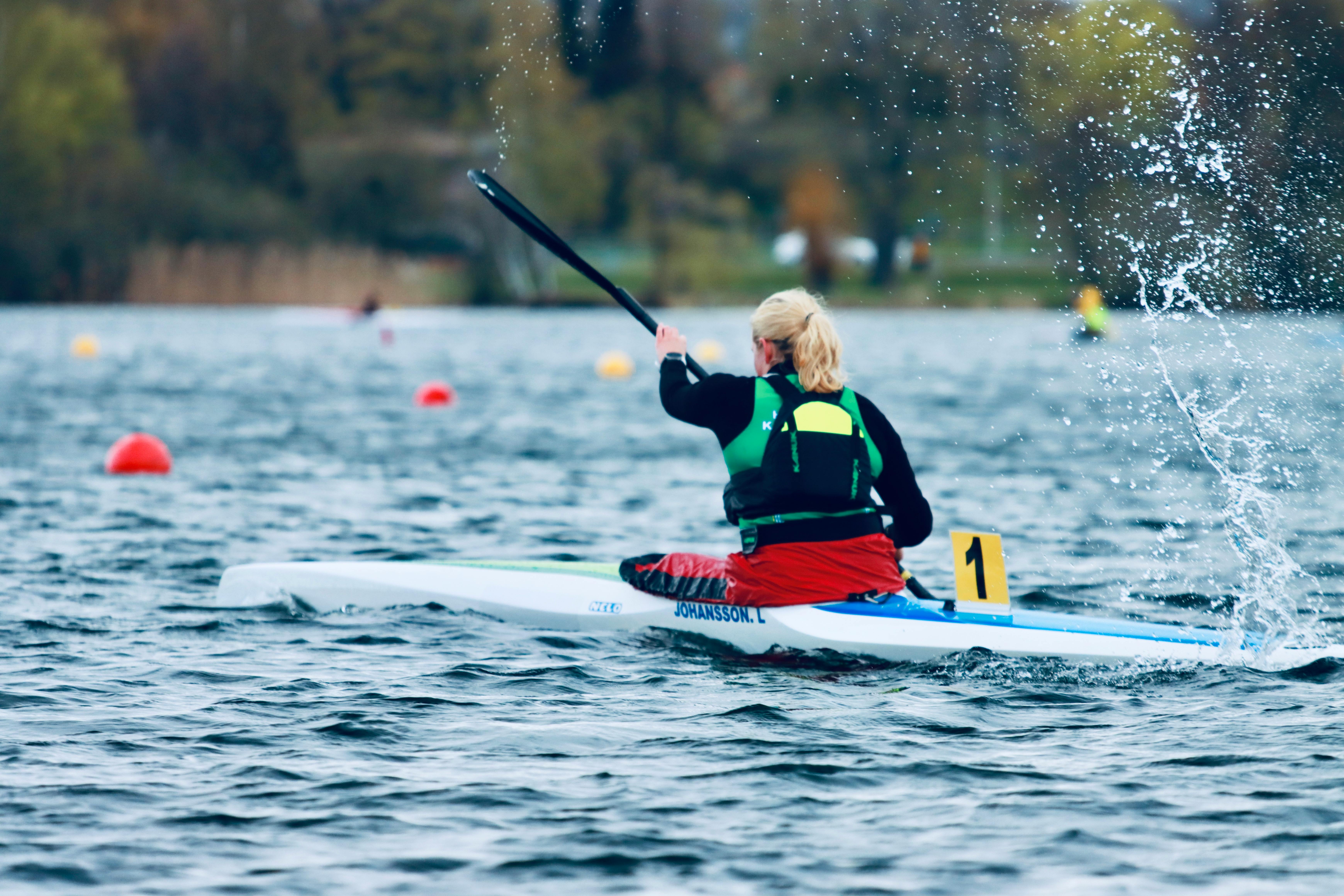 A Woman Kayaking on Lake · Free Stock Photo