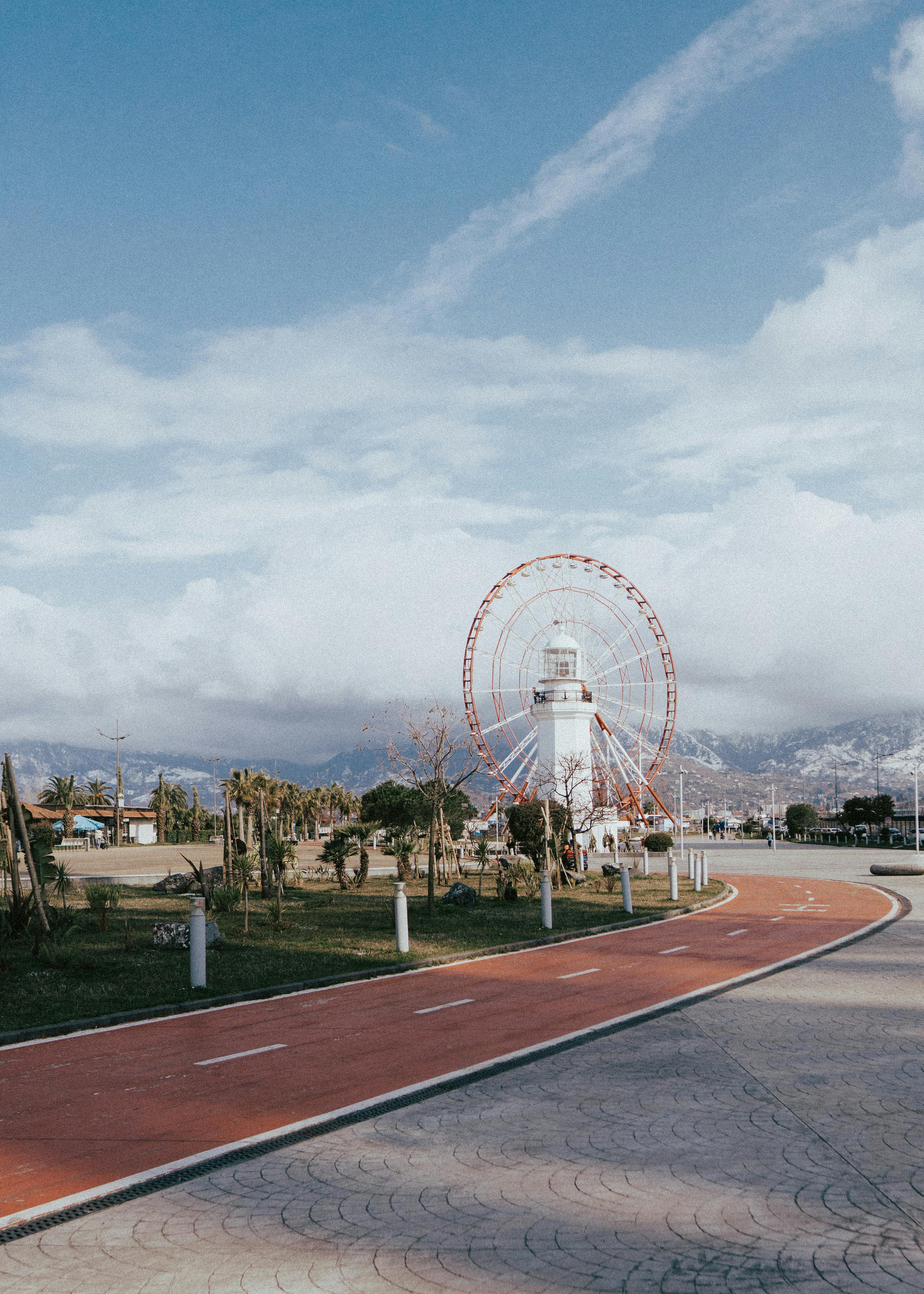 Red Ferris Wheel Under the Blue Sky · Free Stock Photo
