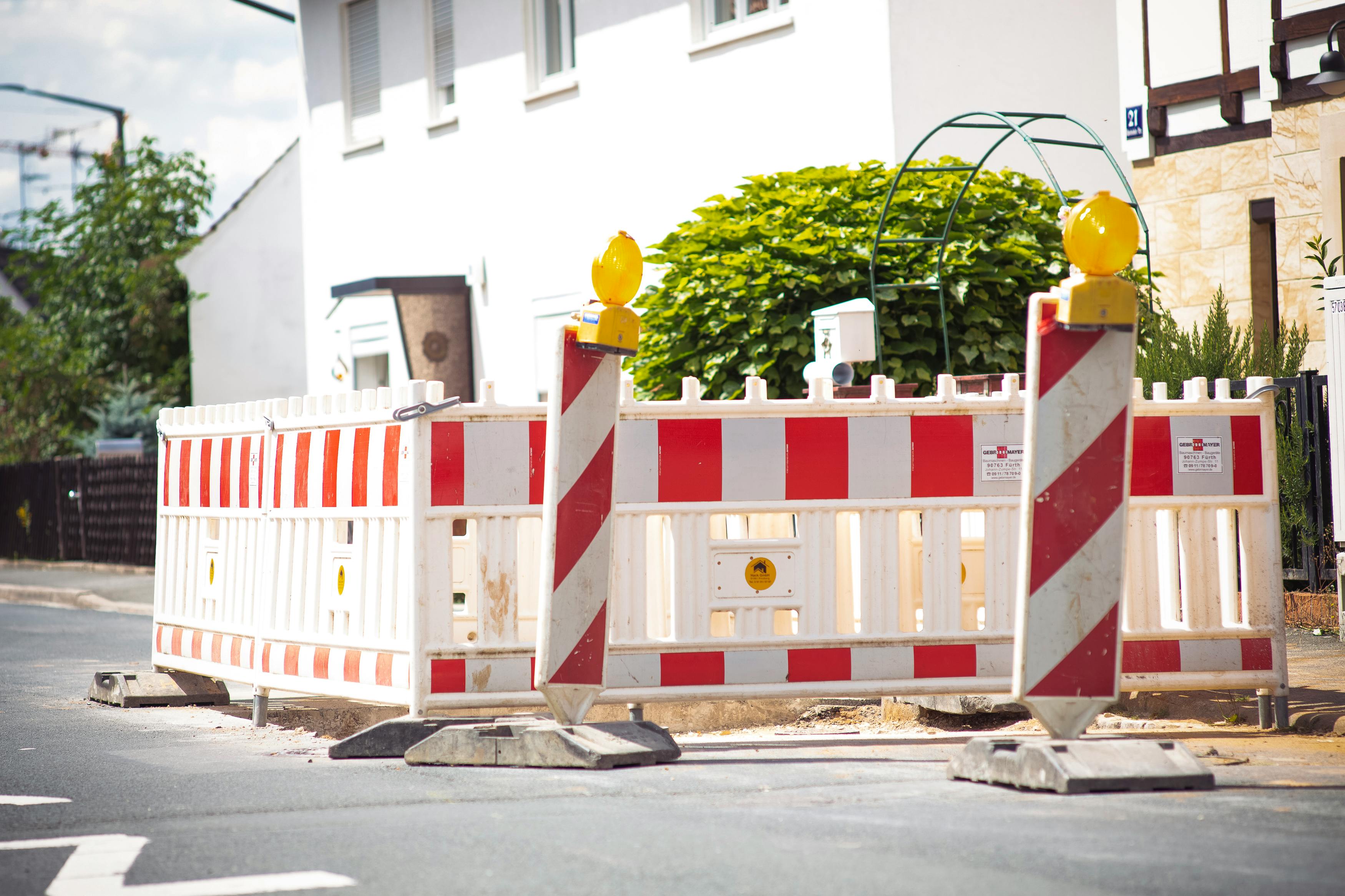 Red and White Road Barriers on the Street · Free Stock Photo
