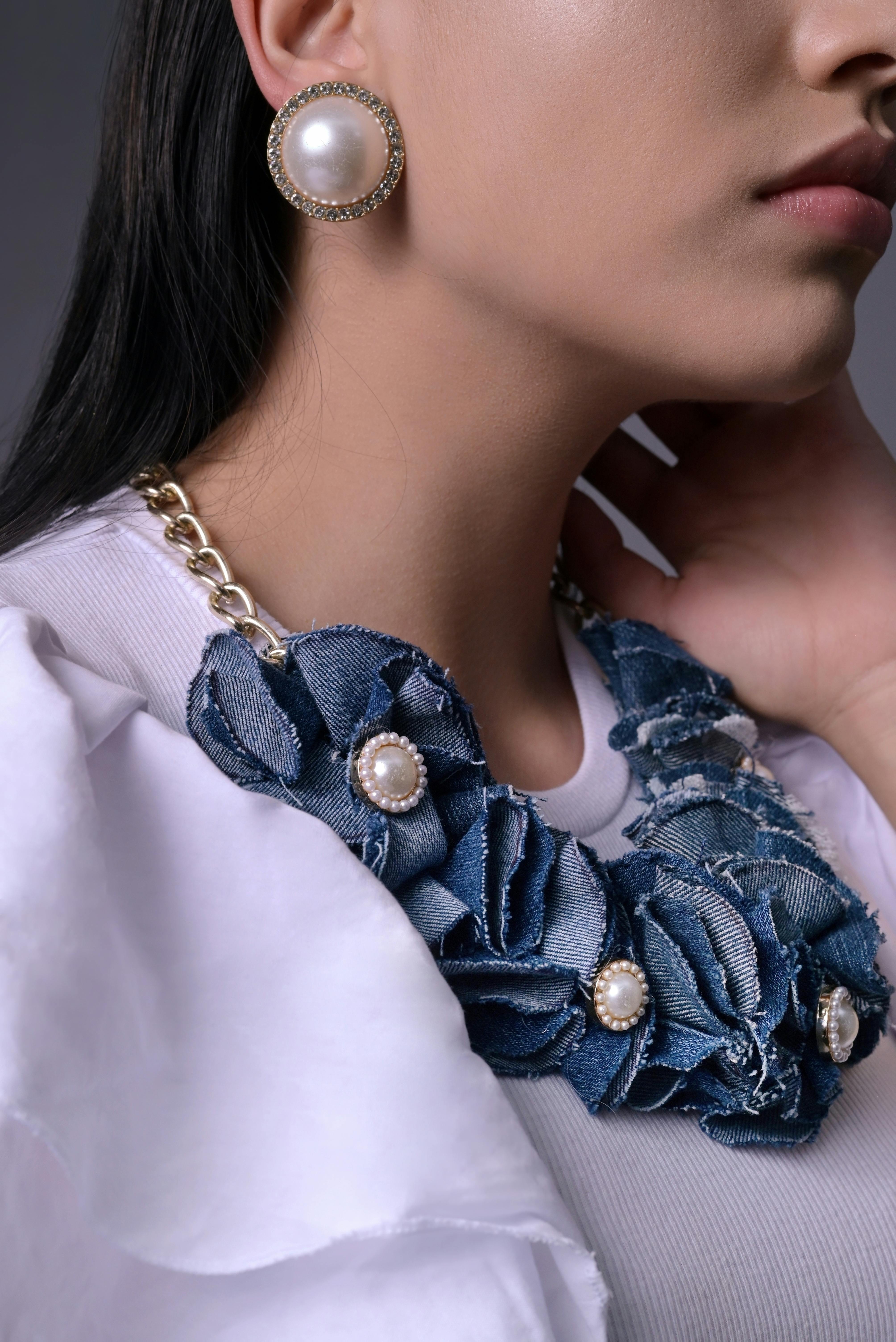 Woman Touching Gold Necklace · Free Stock Photo