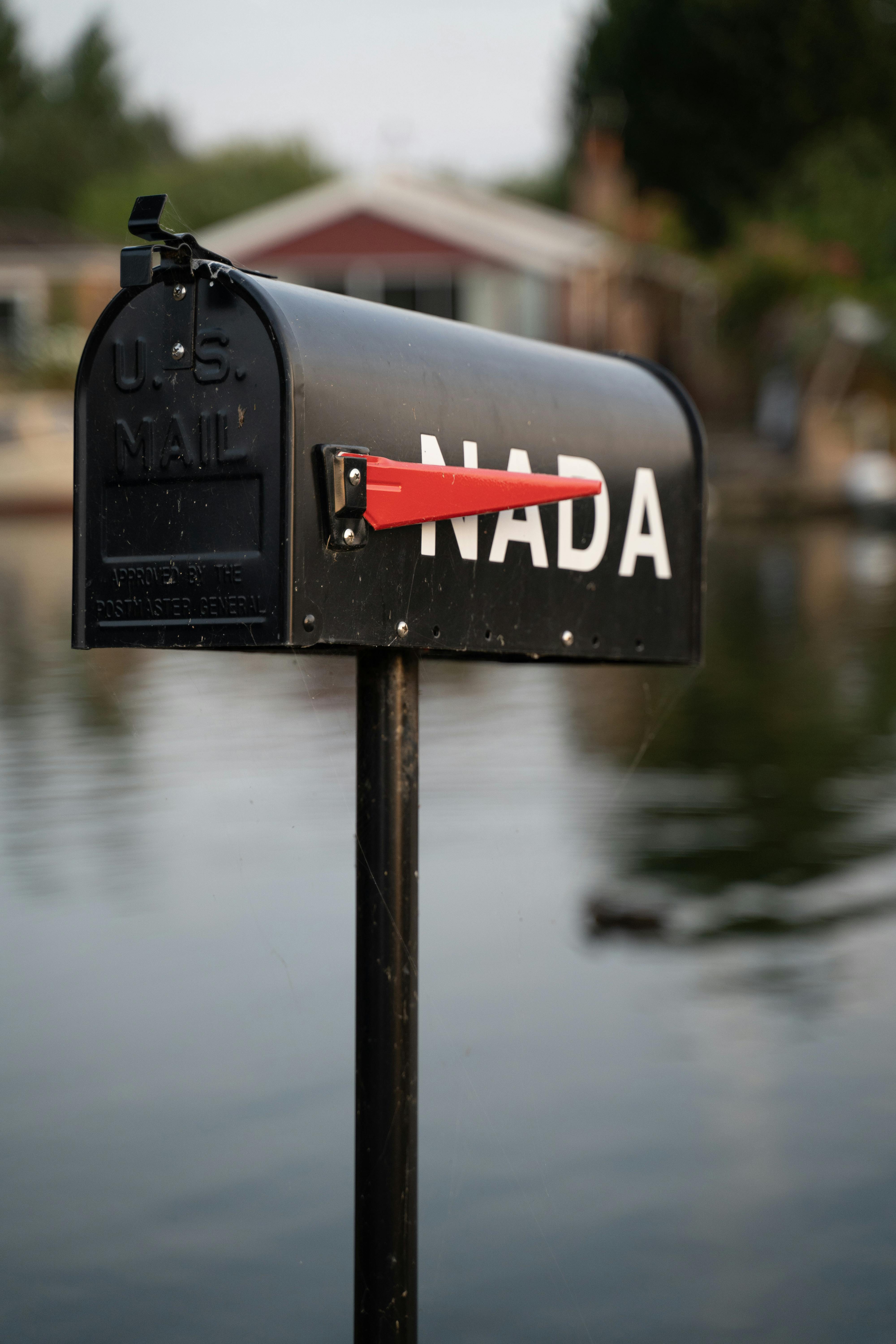 Oblong Brown Metal Mailbox · Free Stock Photo