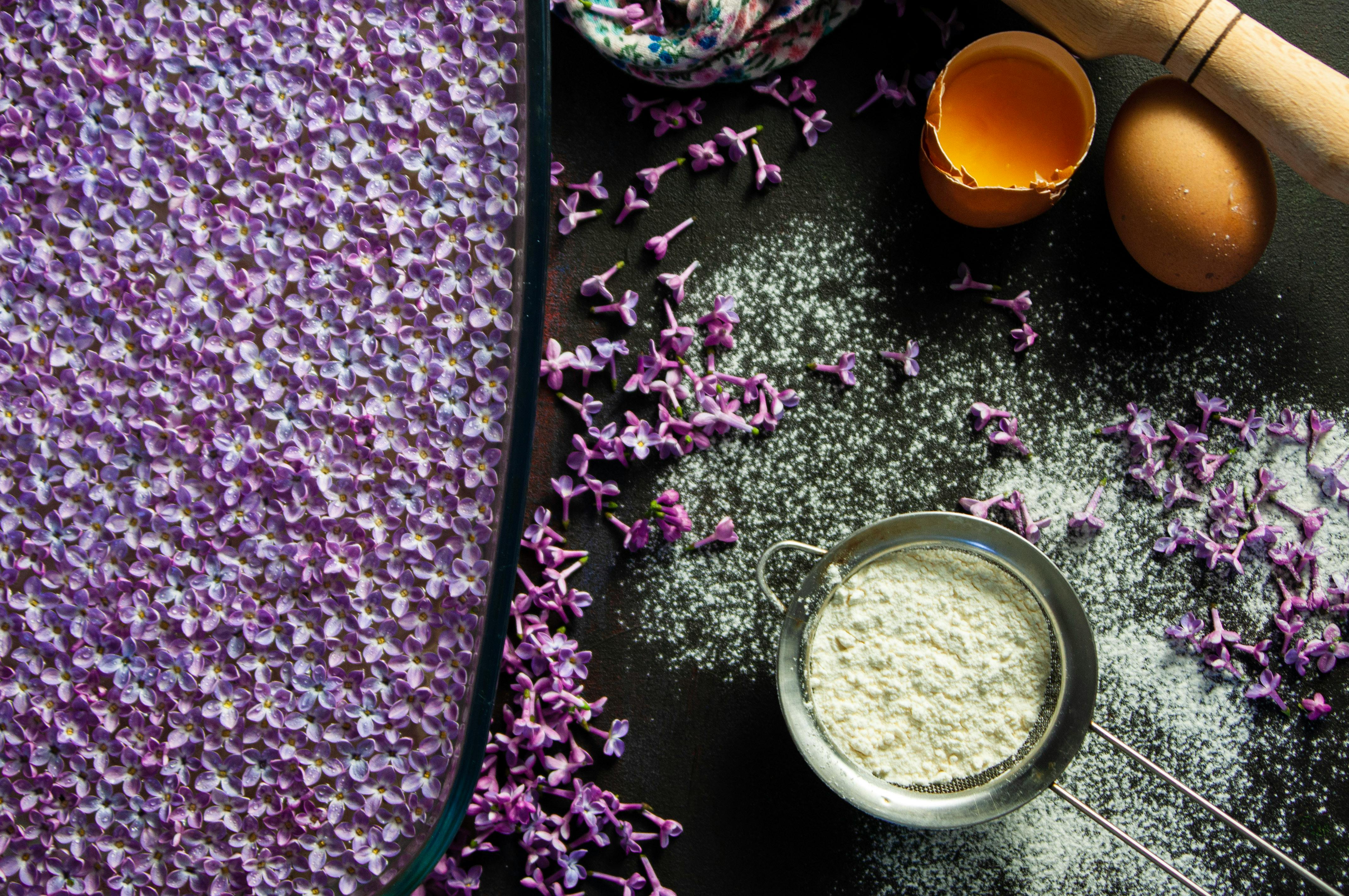 Flour on Sieve and Purple Flowers · Free Stock Photo