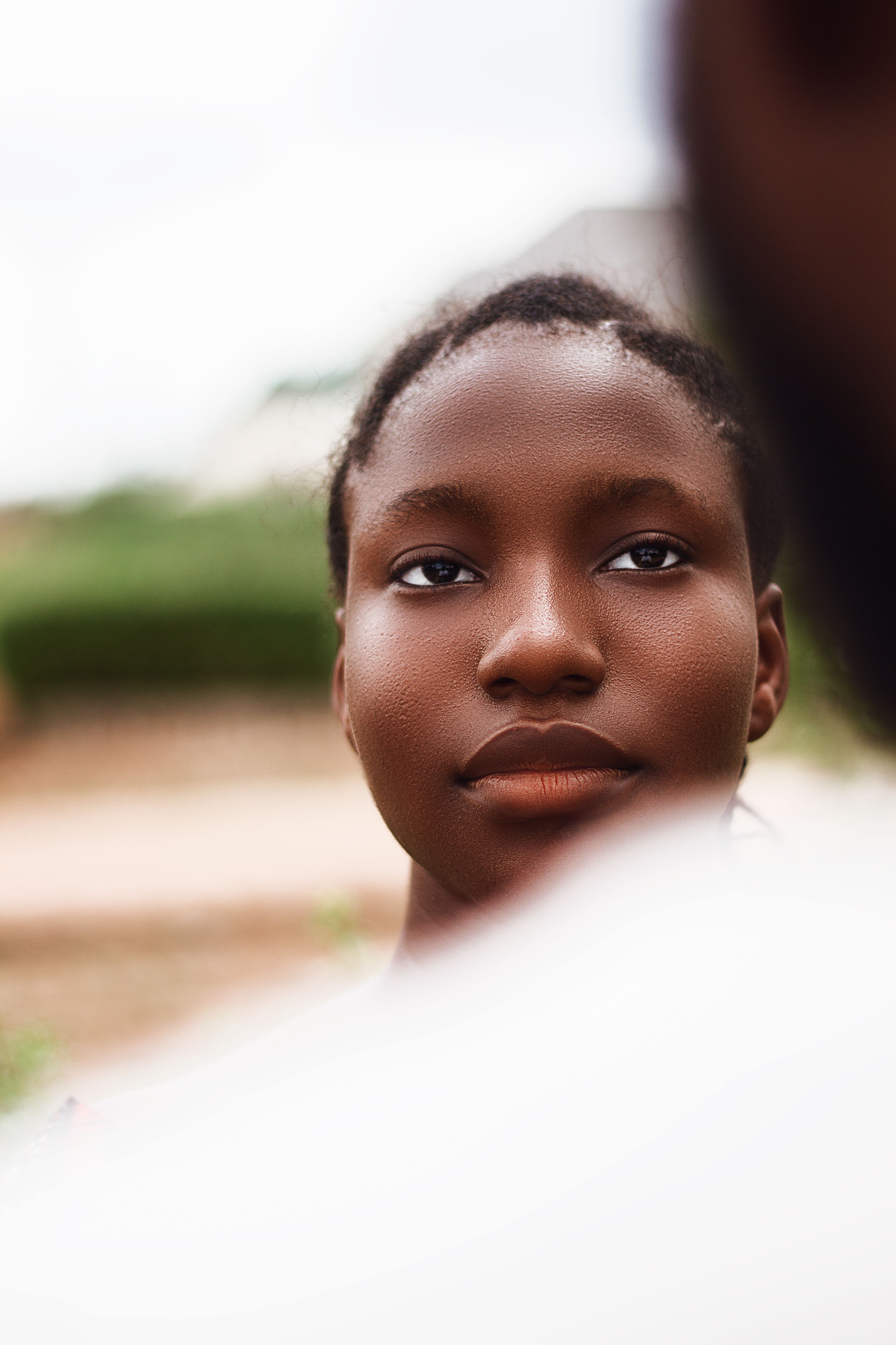 A Young Woman Looking at the Person Standing in front of Her · Free ...