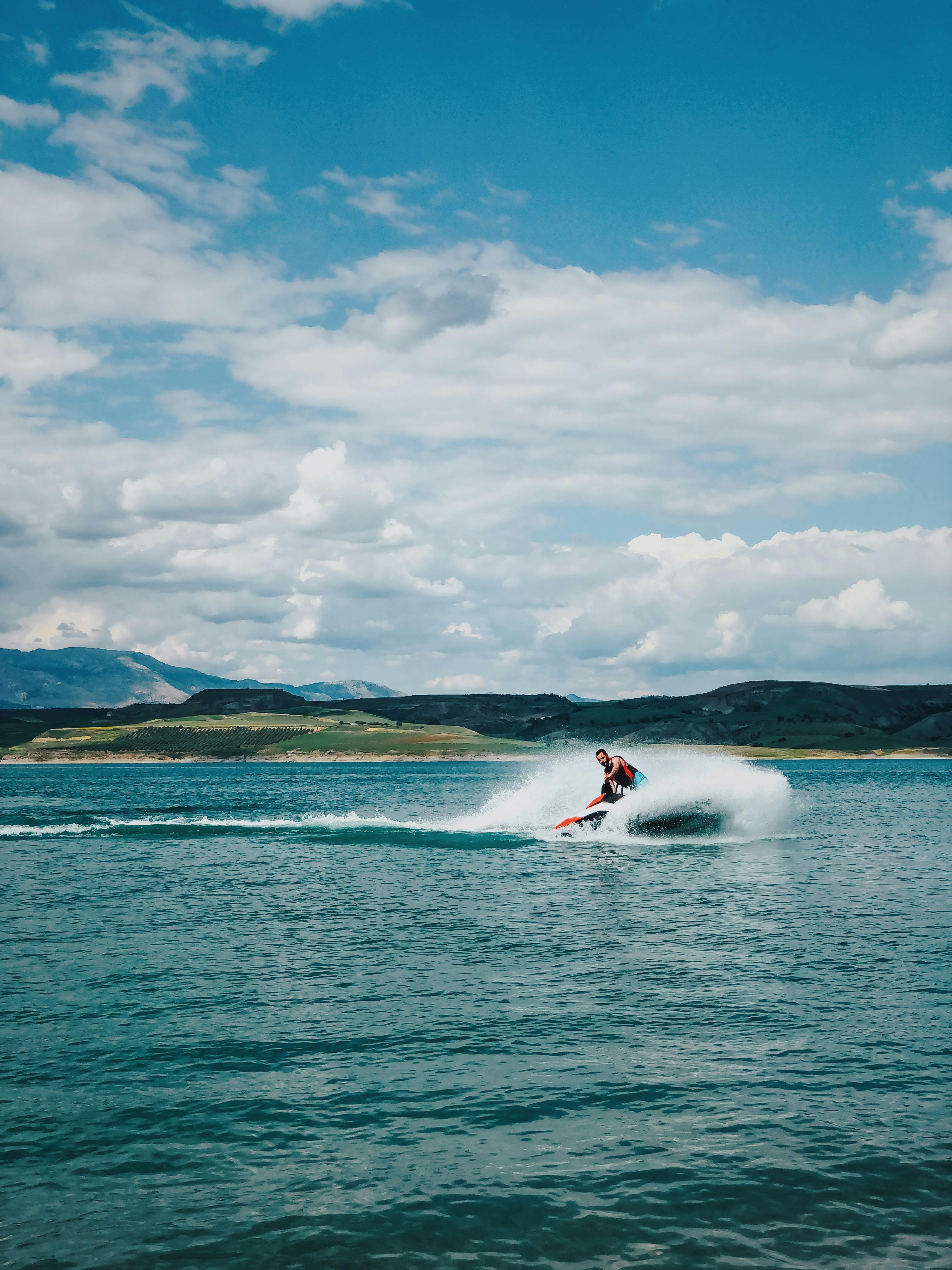 People Riding A Jet Ski · Free Stock Photo