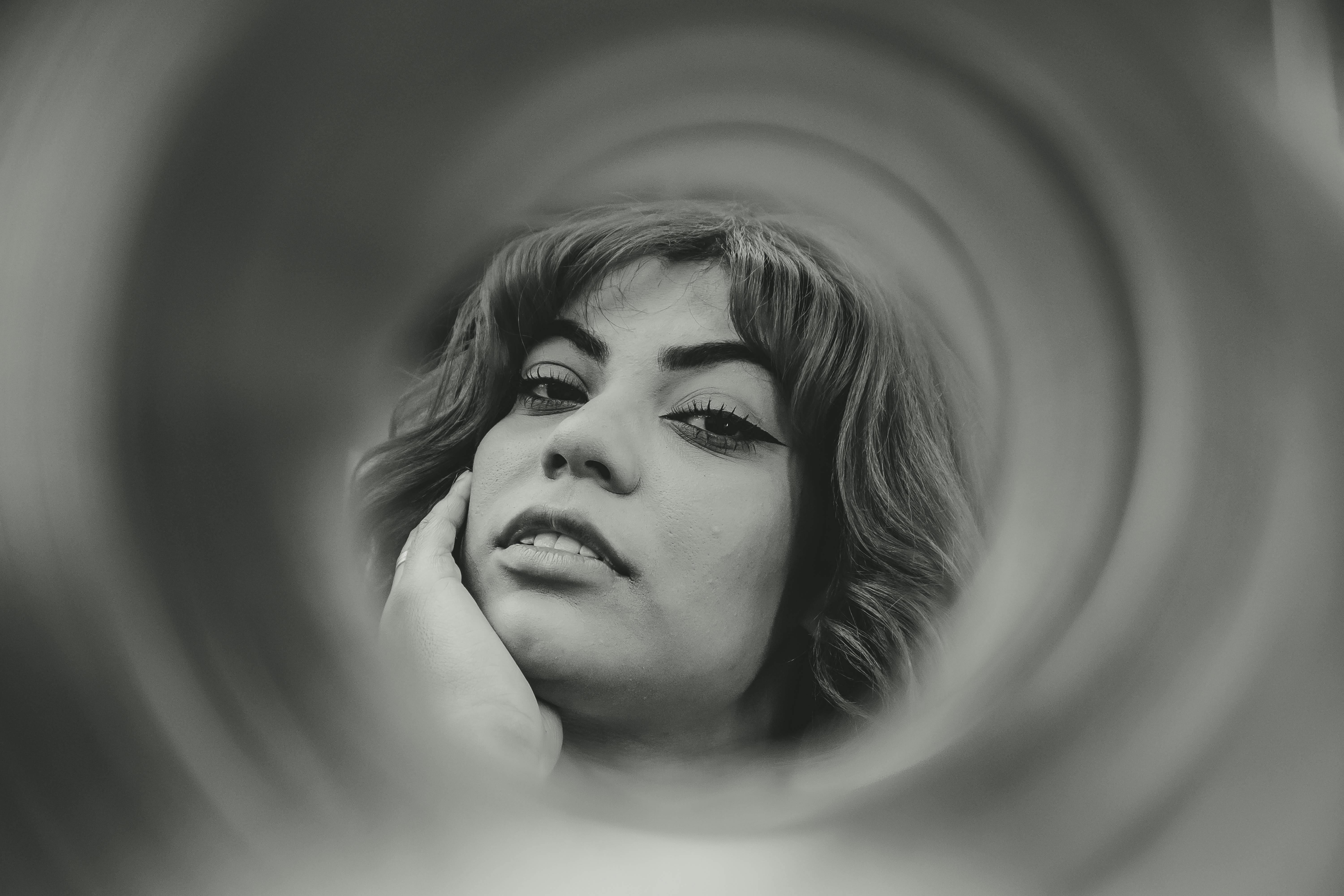 Photo Of Woman Holding Frame · Free Stock Photo